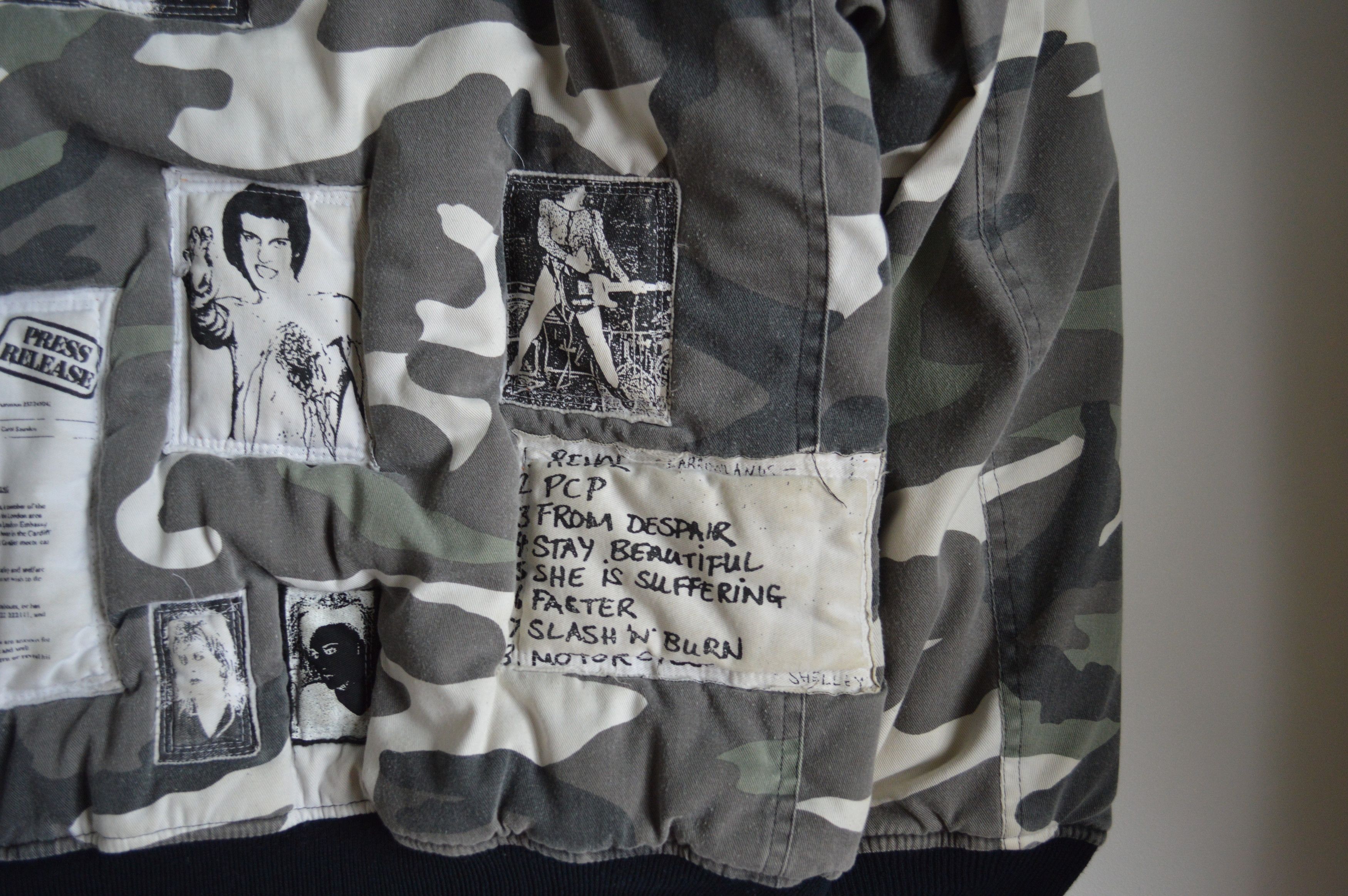 Raf Simons A/W 2001 'Riot Riot Riot' camo patch bomber jacket | Grailed