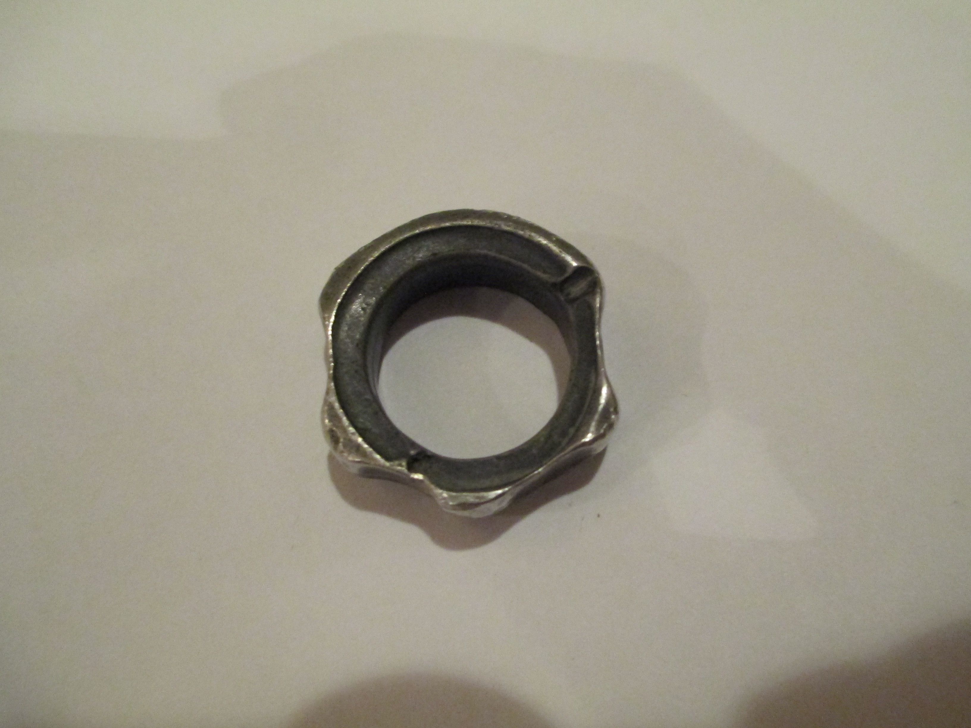 Raf Simons SS03 Consumed ring made of metal waste | Grailed