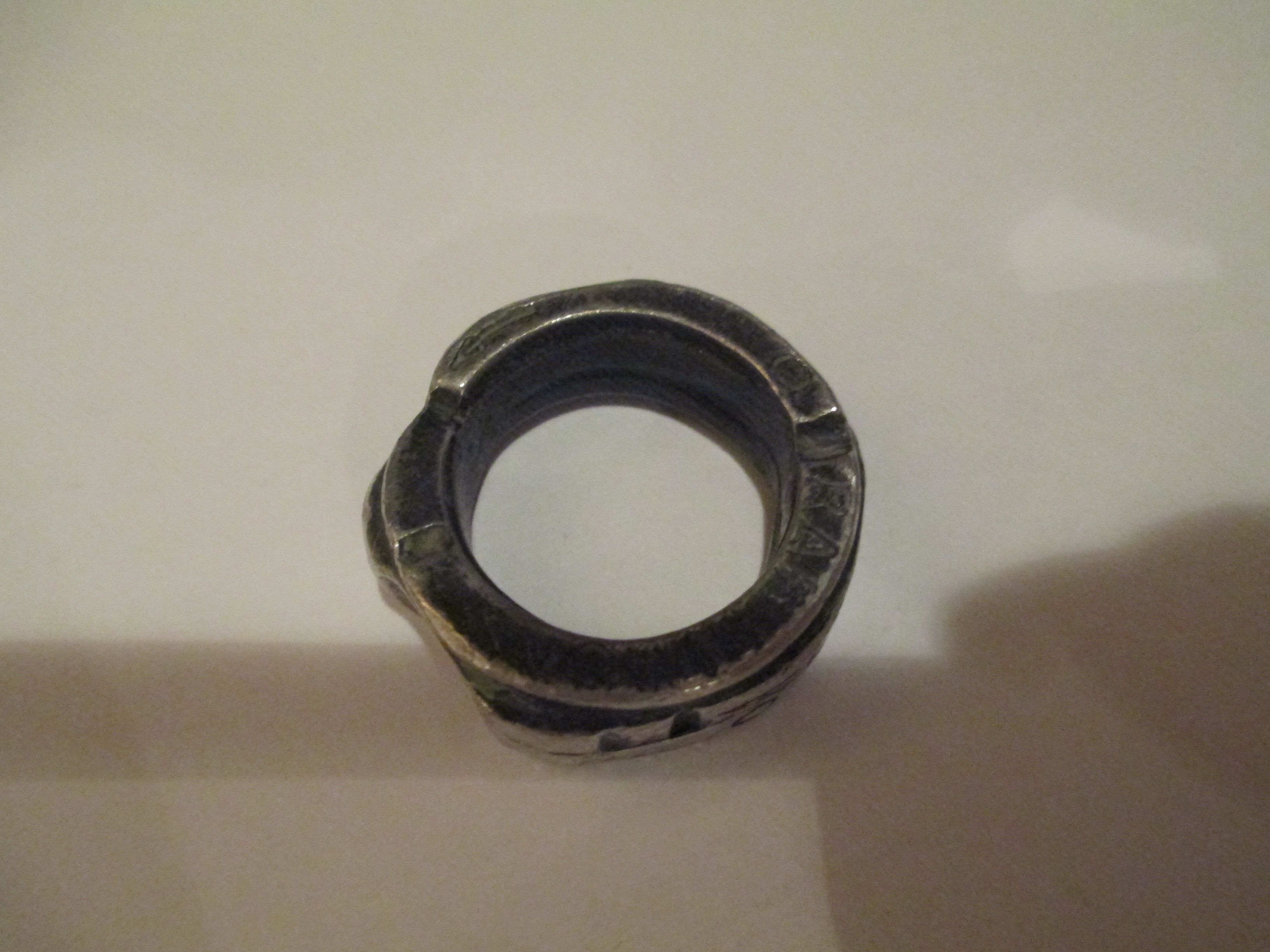 Raf Simons SS03 Consumed ring made of metal waste | Grailed