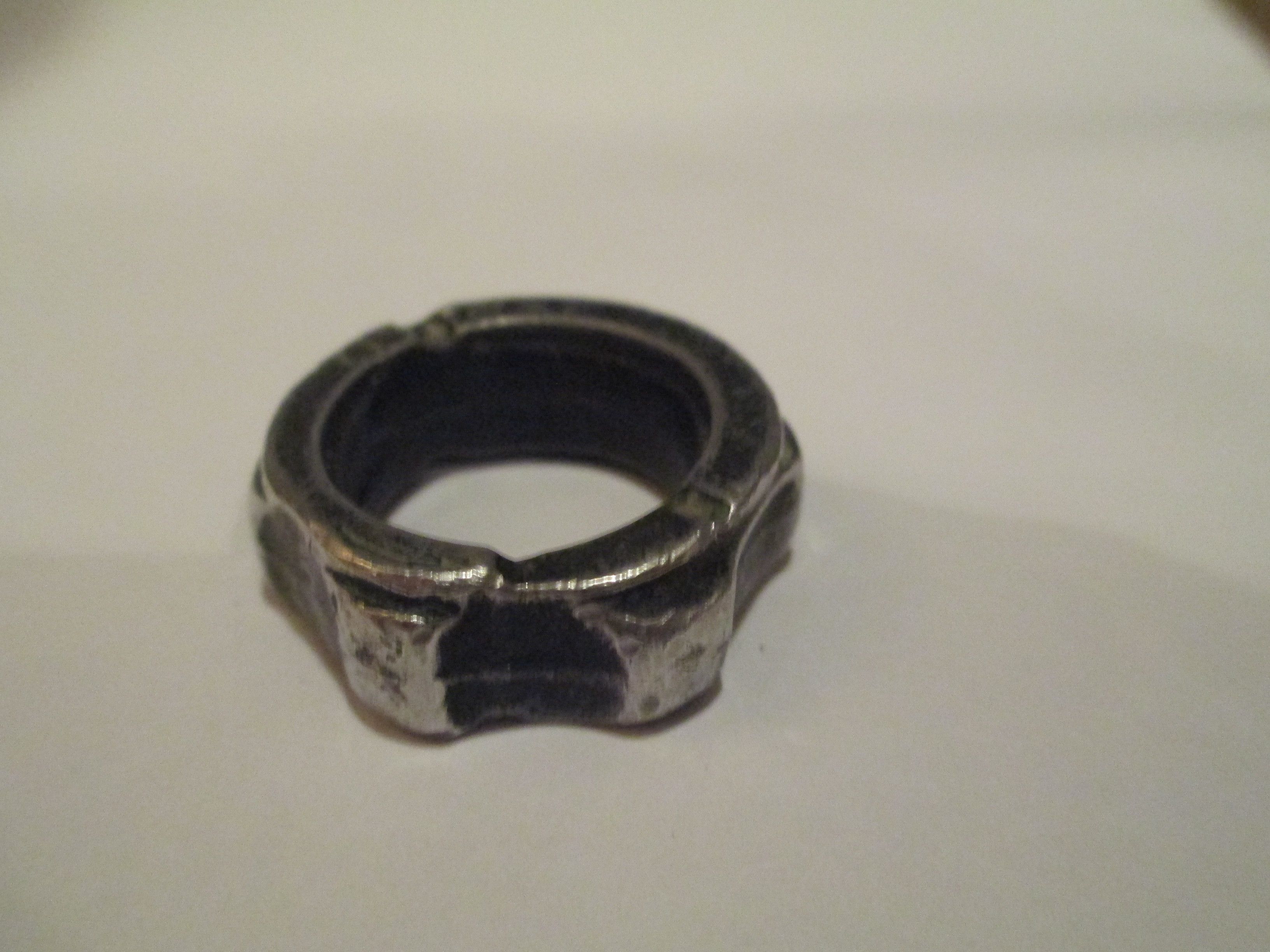 Raf Simons SS03 Consumed ring made of metal waste | Grailed