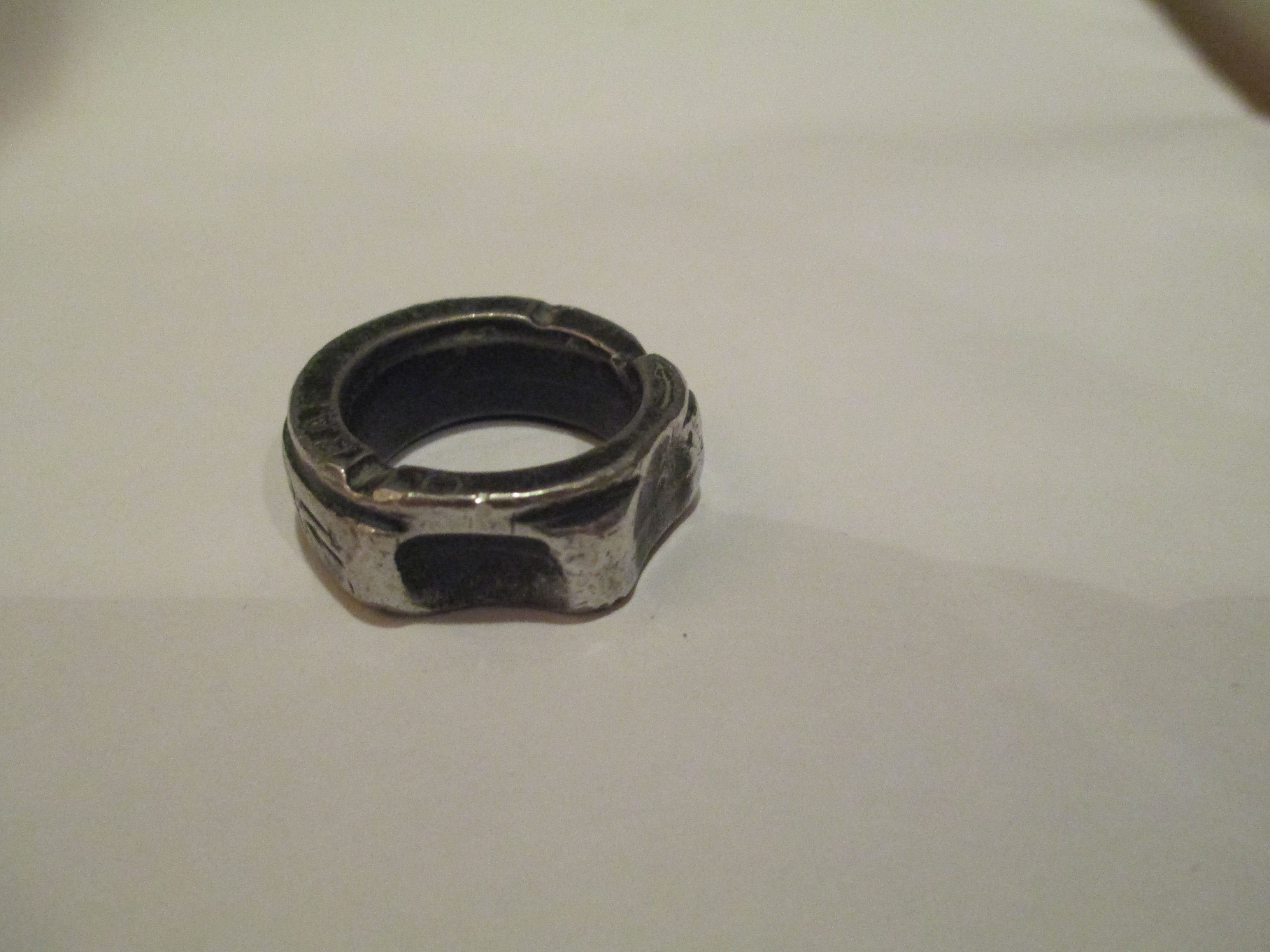 Raf Simons SS03 Consumed ring made of metal waste | Grailed