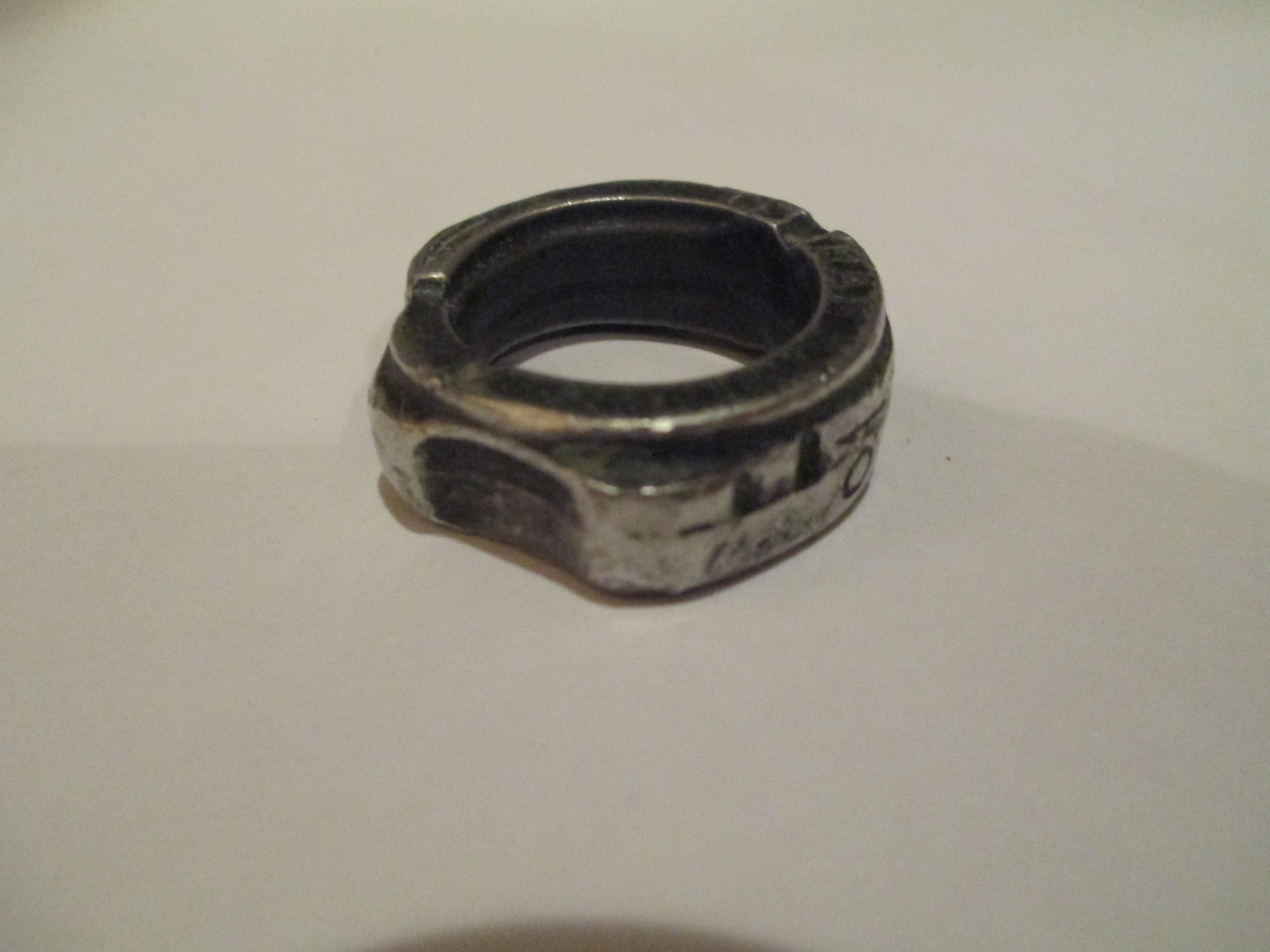 Raf Simons SS03 Consumed ring made of metal waste | Grailed