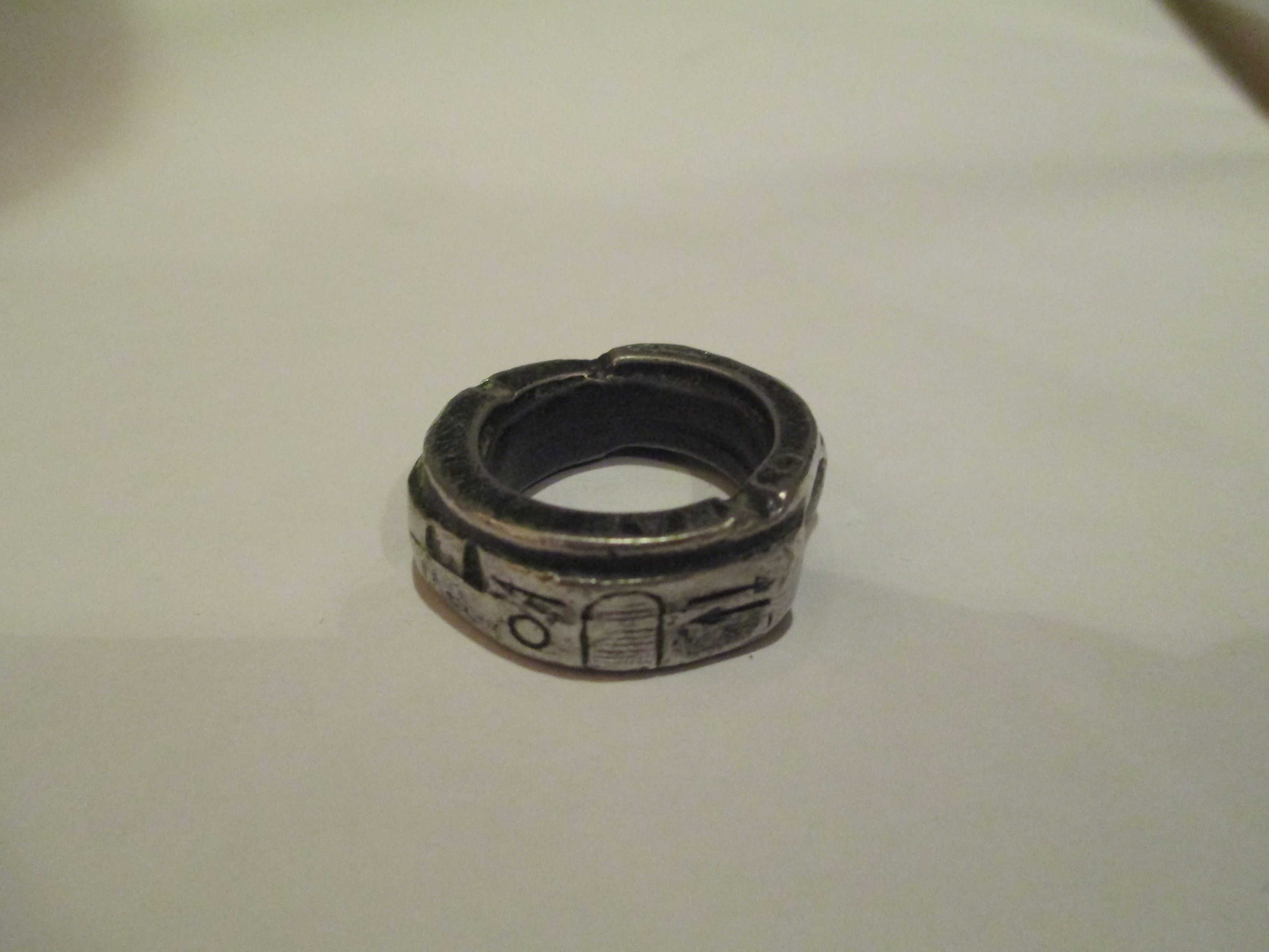 Raf Simons SS03 Consumed ring made of metal waste | Grailed