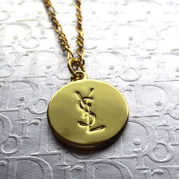 Yves Saint Laurent Gold YSL Circle Logo Pendant Necklace | Grailed
