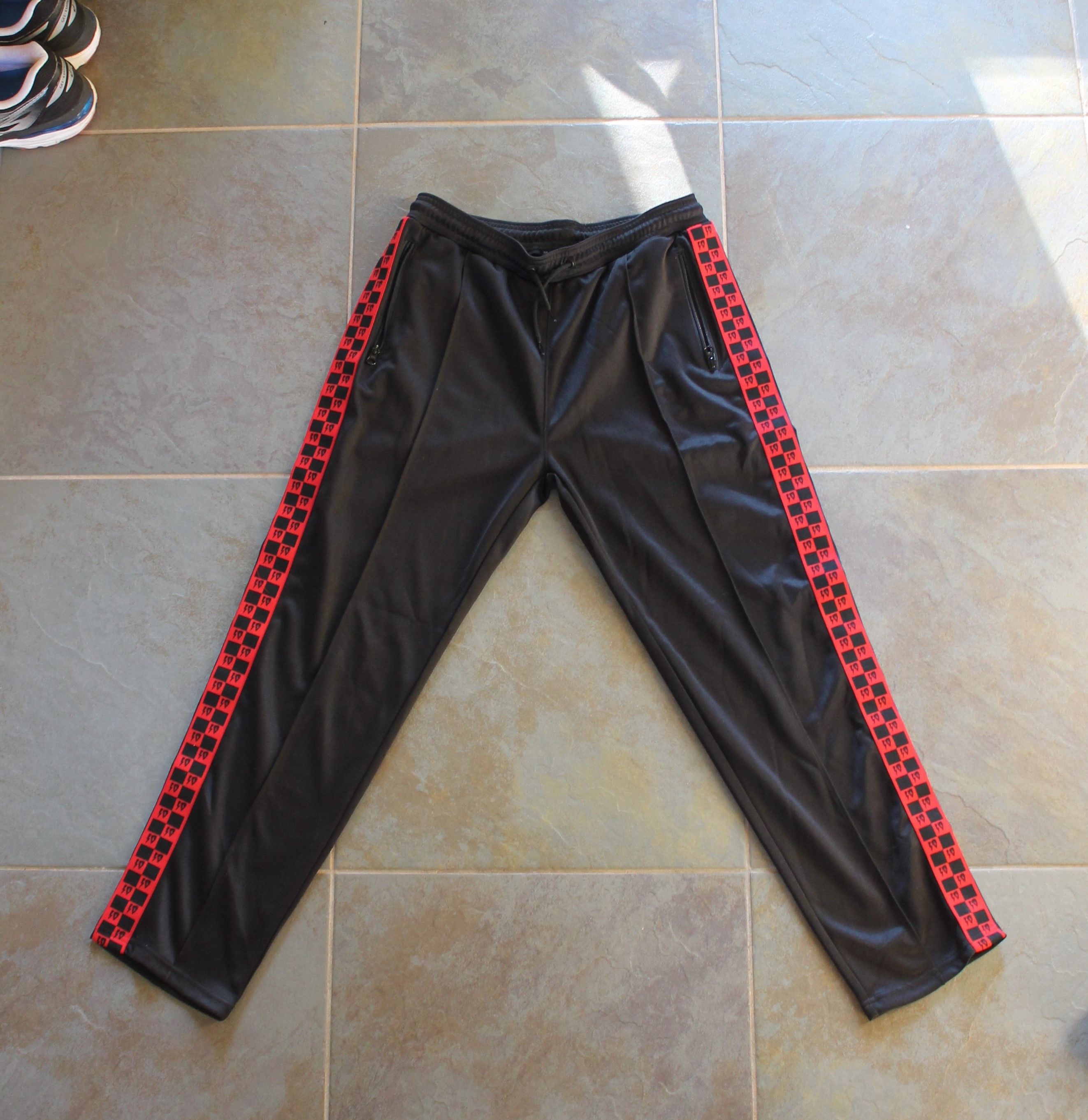 10 Deep Checkered Flag Track Pants | Grailed