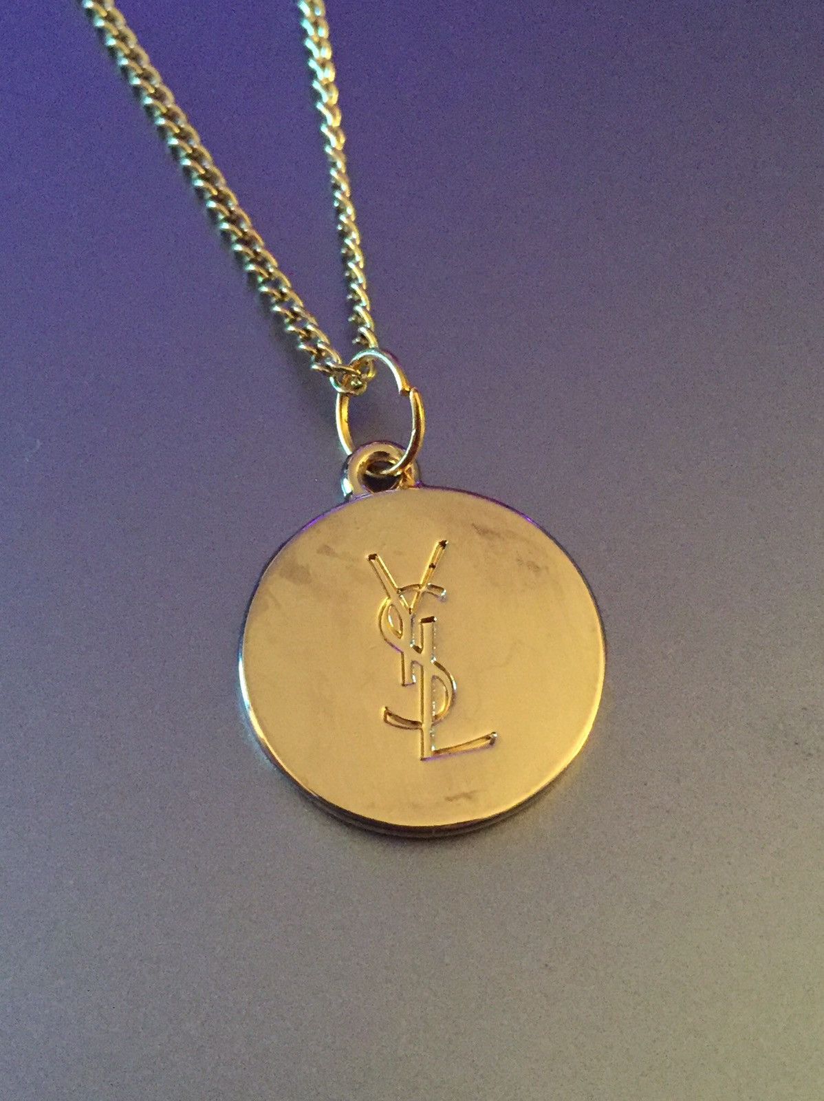 Yves Saint Laurent Yves Saint Laurent Gold YSL Circle Logo Pendant ...