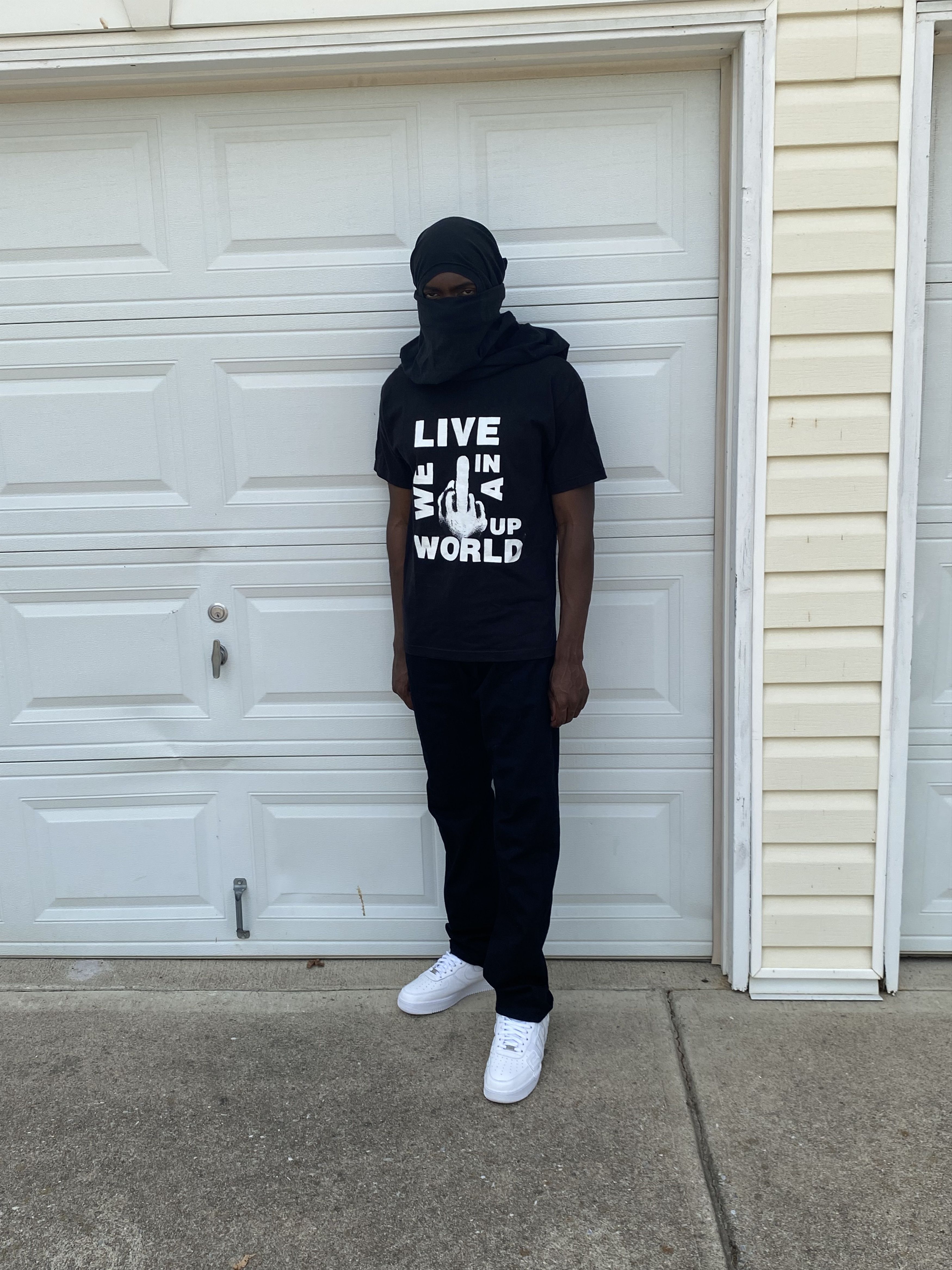 Supreme We Live In A Middle Finger Up World Ugly Wrld T-Shirt | Grailed