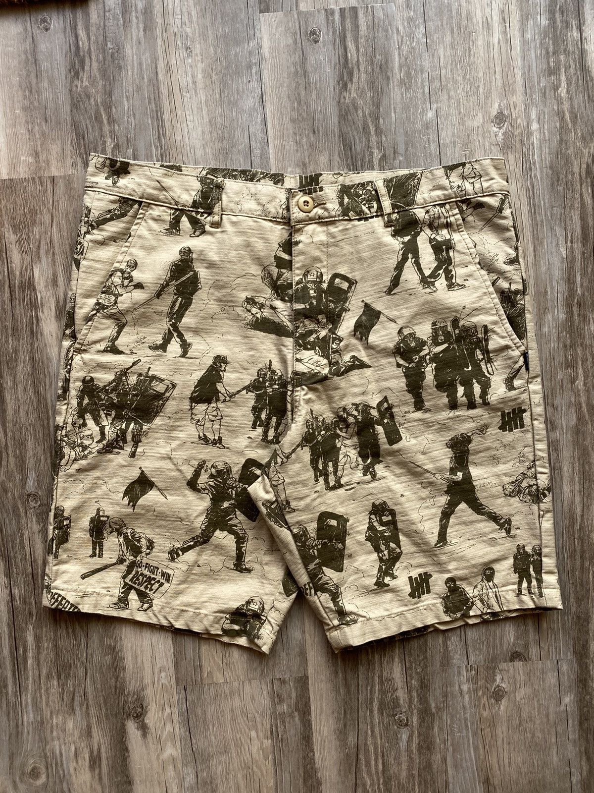Vintage Vintage Y2K Undefeated Riot Police Graphic Print Shorts | Grailed