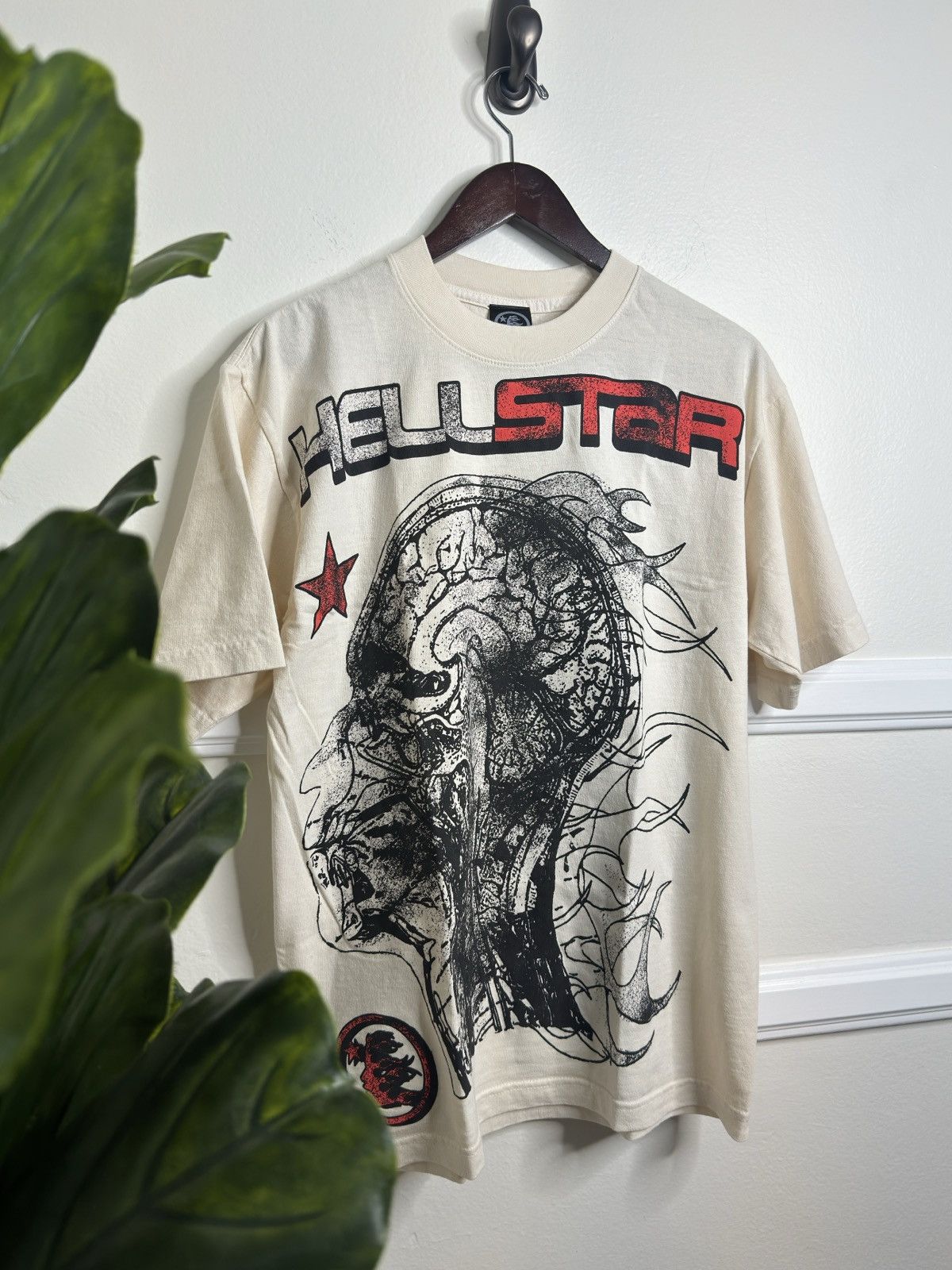 HELLSTAR Hellstar Studios Human Development Tee Cream | Grailed