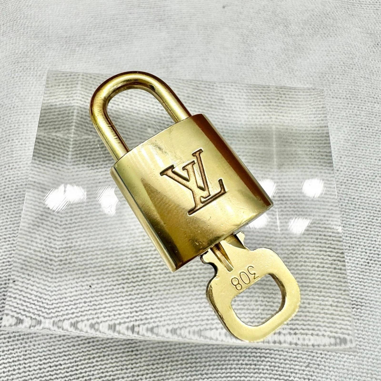 Louis Vuitton Louis Vuitton Lock and Key | Grailed