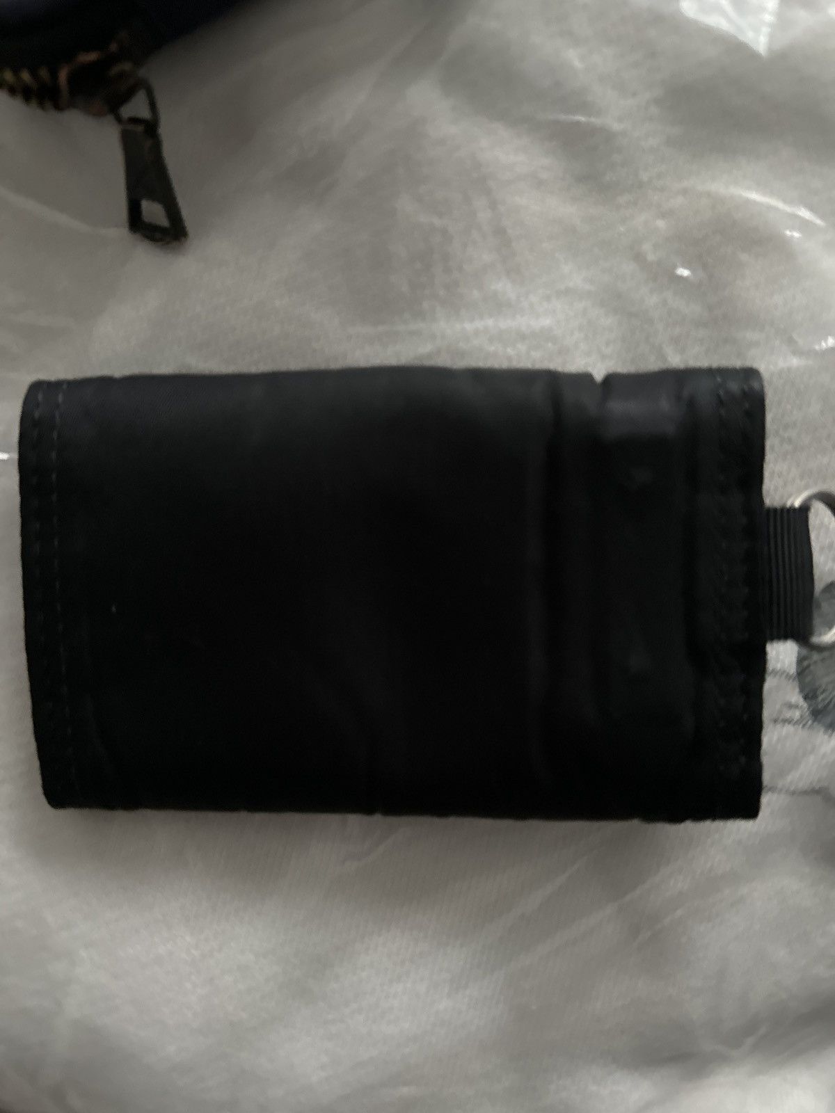 Kaws × Porter Kaws porter key wallet | Grailed