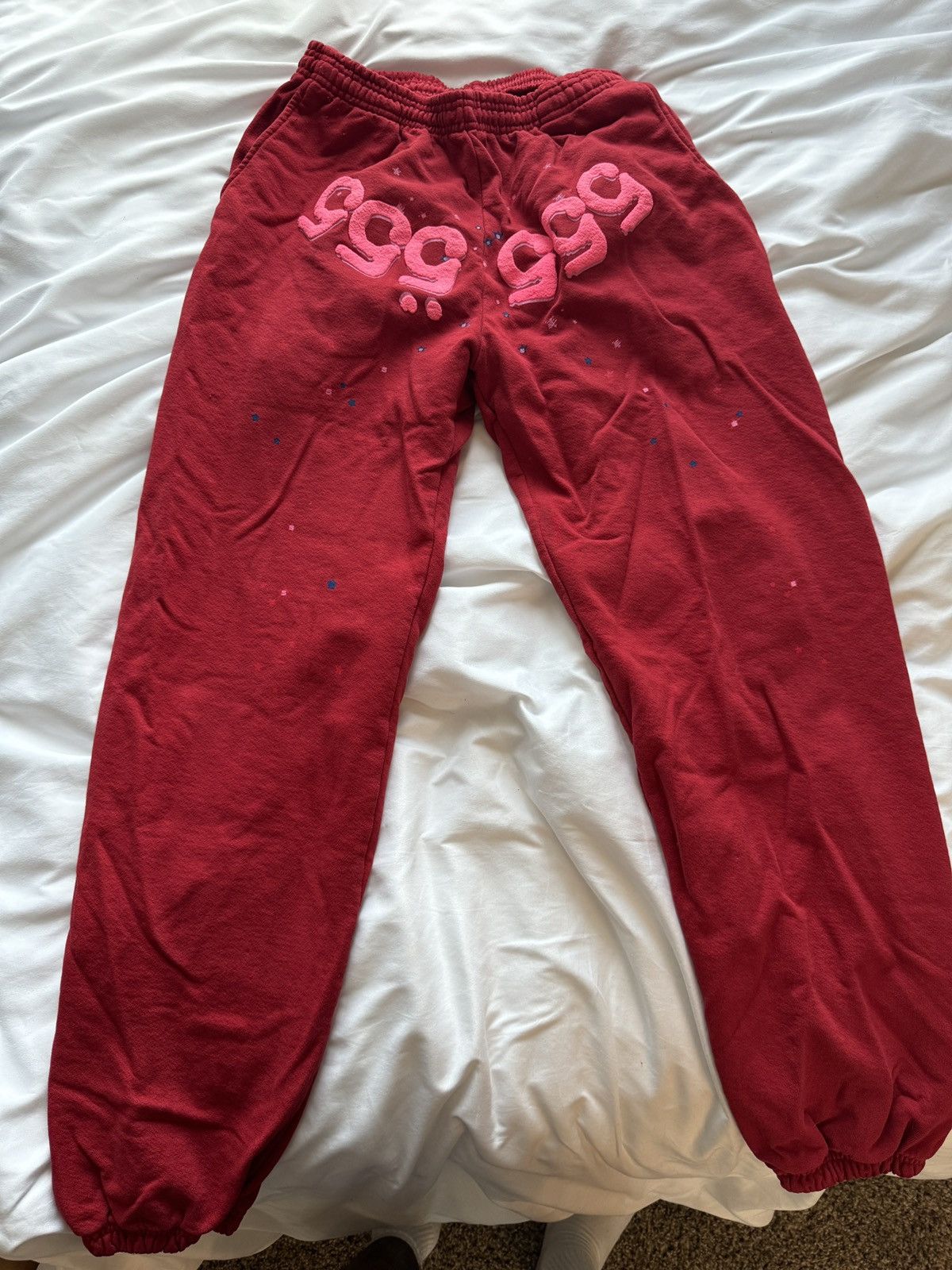 Spider Worldwide Spider worldwide red sweats | Grailed