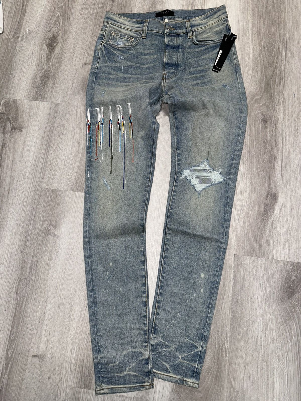 Amiri Amiri Paint Drip Logo Jeans | Grailed