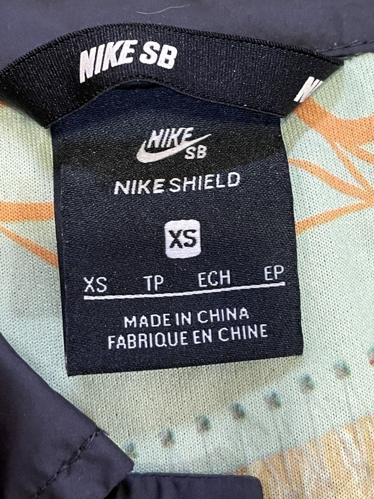 Nike × Streetwear × Windbreaker Nike SB Shield Icon Quilt Coach Jacket ...