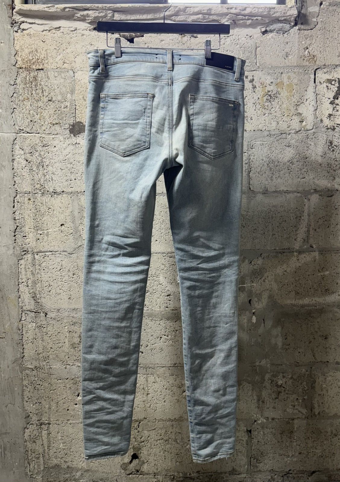 Amiri AMIRI Mx1 Light Wash White Patch Jeans | Grailed