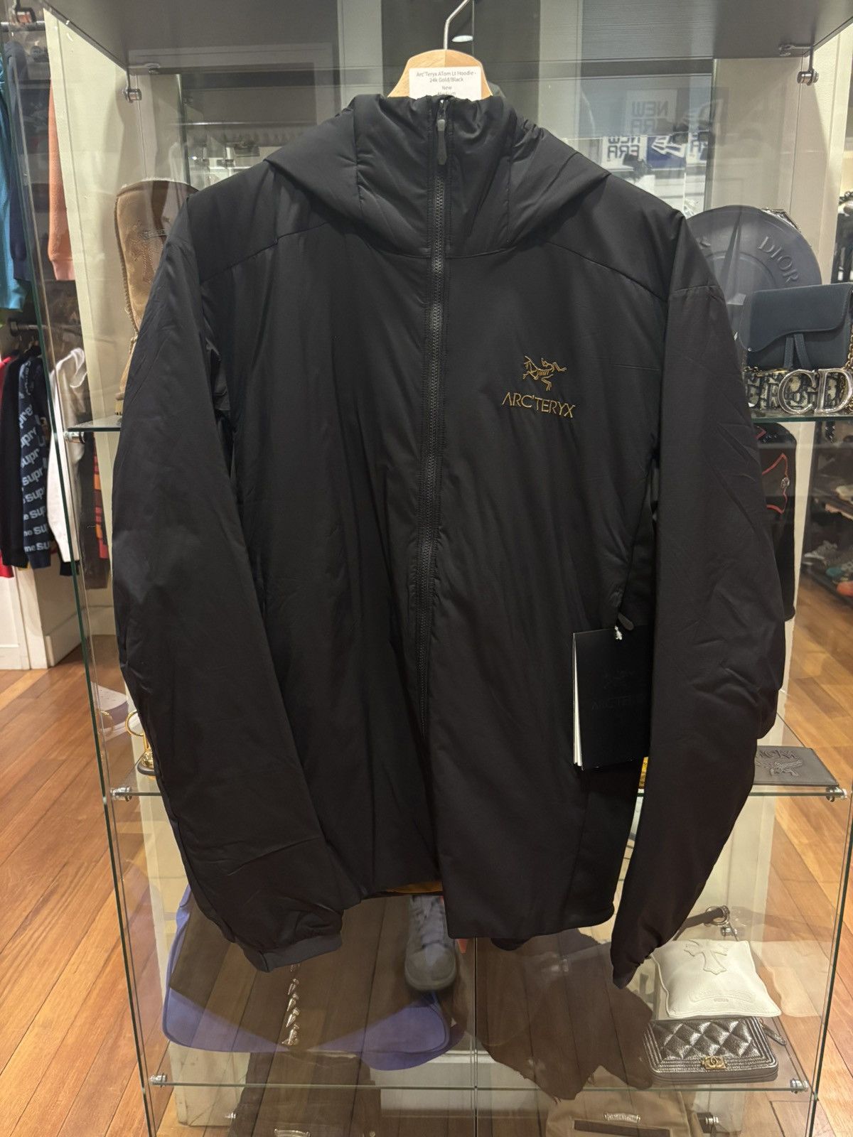 Arc'teryx Arc’teryx Atom LT Hoodie- Black/24k gold | Grailed