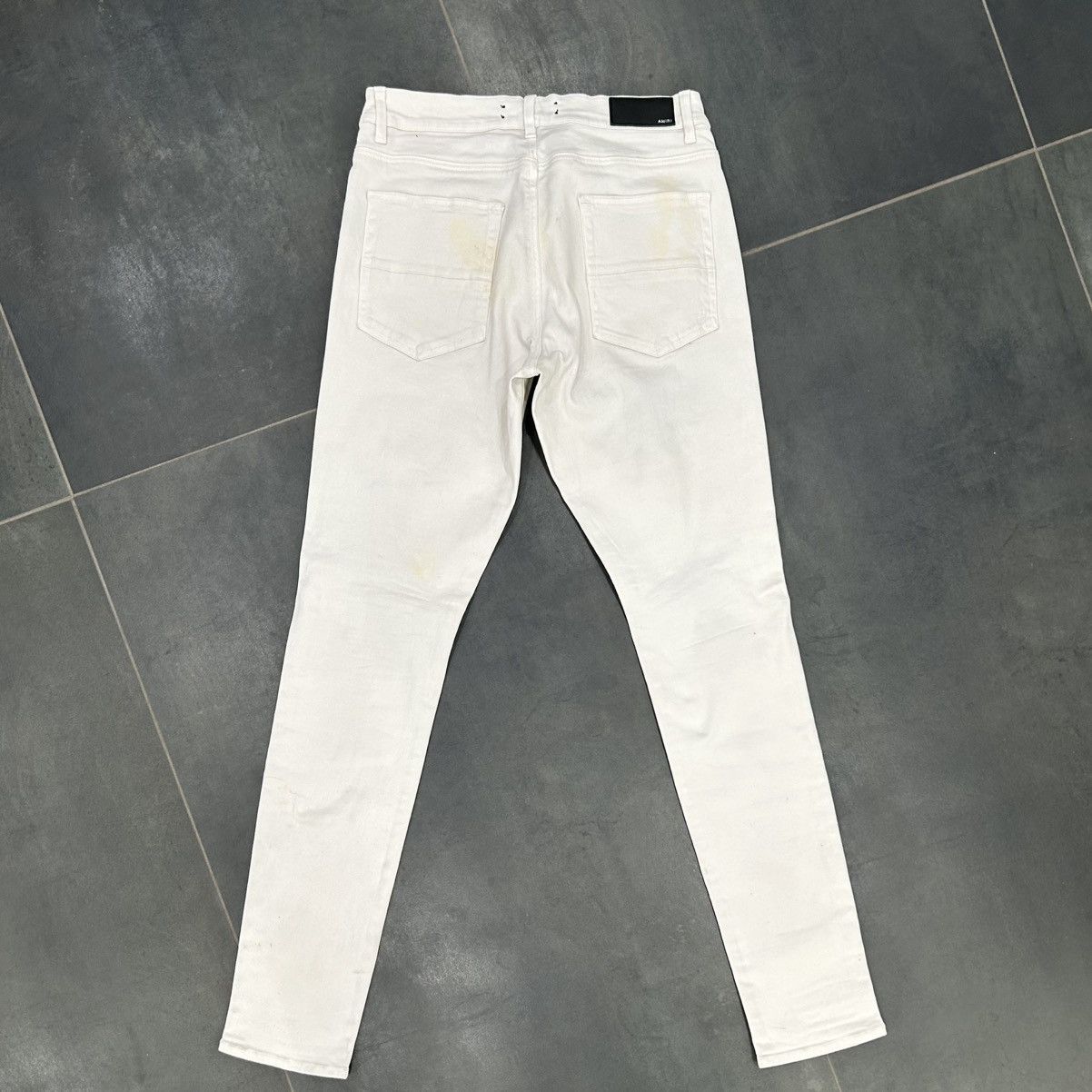 Amiri #62790 Amiri Black/White Patch Jeans (White) | Grailed