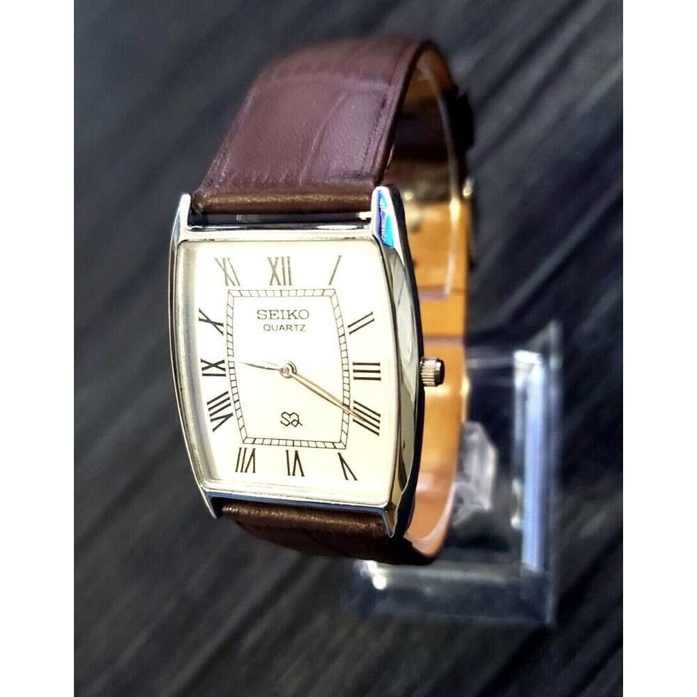 Seiko RARE NOS Seiko Men Barrel Tank White Roman Dial Brown Strap | Grailed