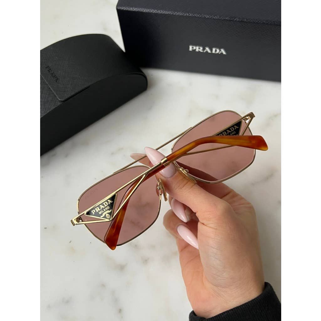 Prada NEWEST RELEASE Prada PR A50S Sunglasses in Gold Pink | Grailed