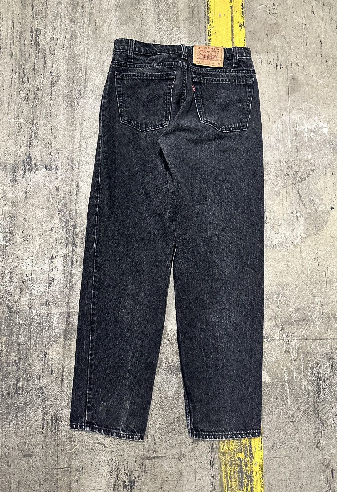Vintage Vintage Levi’s 550 black jeans | Grailed