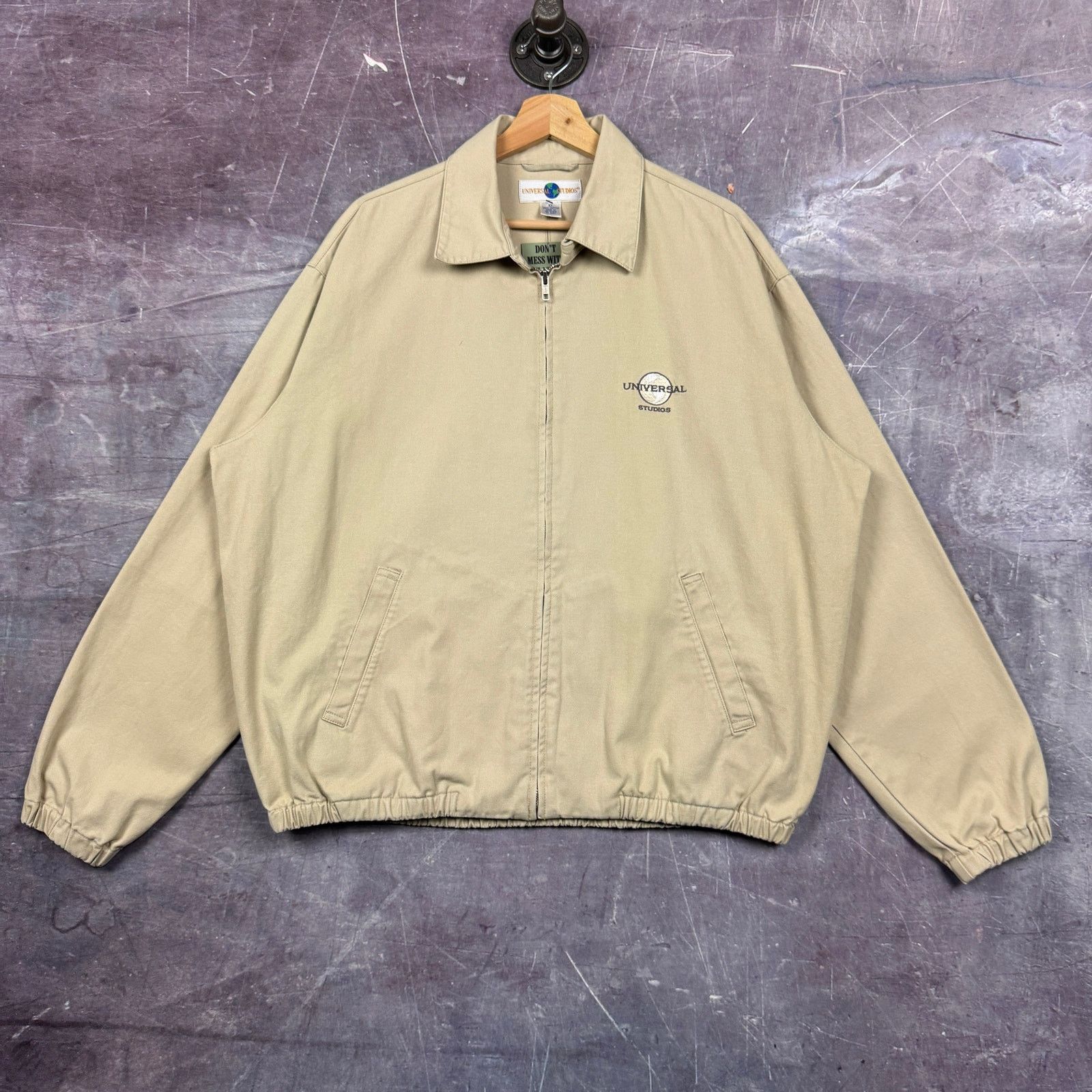Streetwear × Universal Studios × Vintage 90s Tan Universal Studios Embroidered Zip Up Jacket XL ...