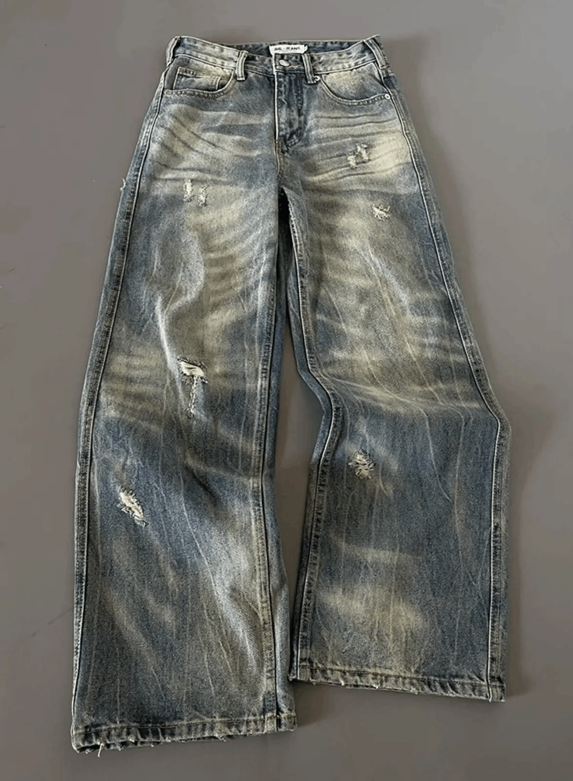 Streetwear Faded wash textured design baggy jeans | Grailed