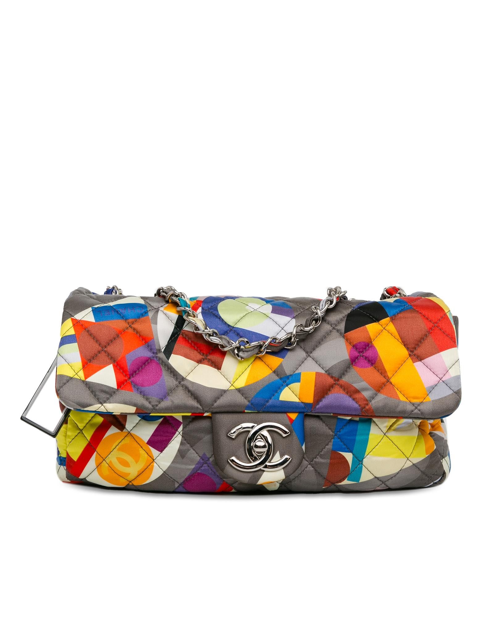 Chanel Quilted Nylon Flap Bag with Interlocking Cs Closure | Grailed