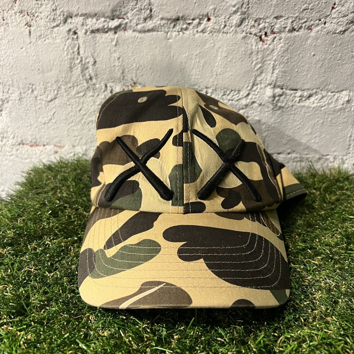 Bape × Kaws Bape x Kaws 1st Camo Fitted Cap | Grailed