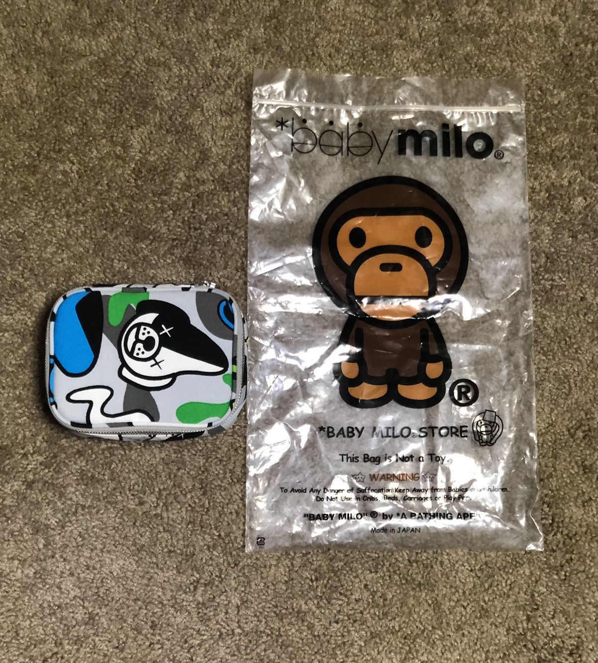 Bape Very Rare Bape x Kaws Baby Milo Animal Kingdom Zip Pouch | Grailed