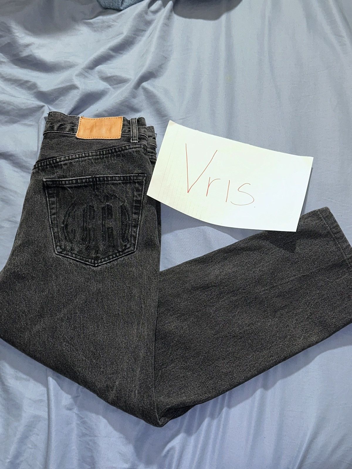 Menace EMBOSSED TARGET LOGO DENIM PANTS | Grailed