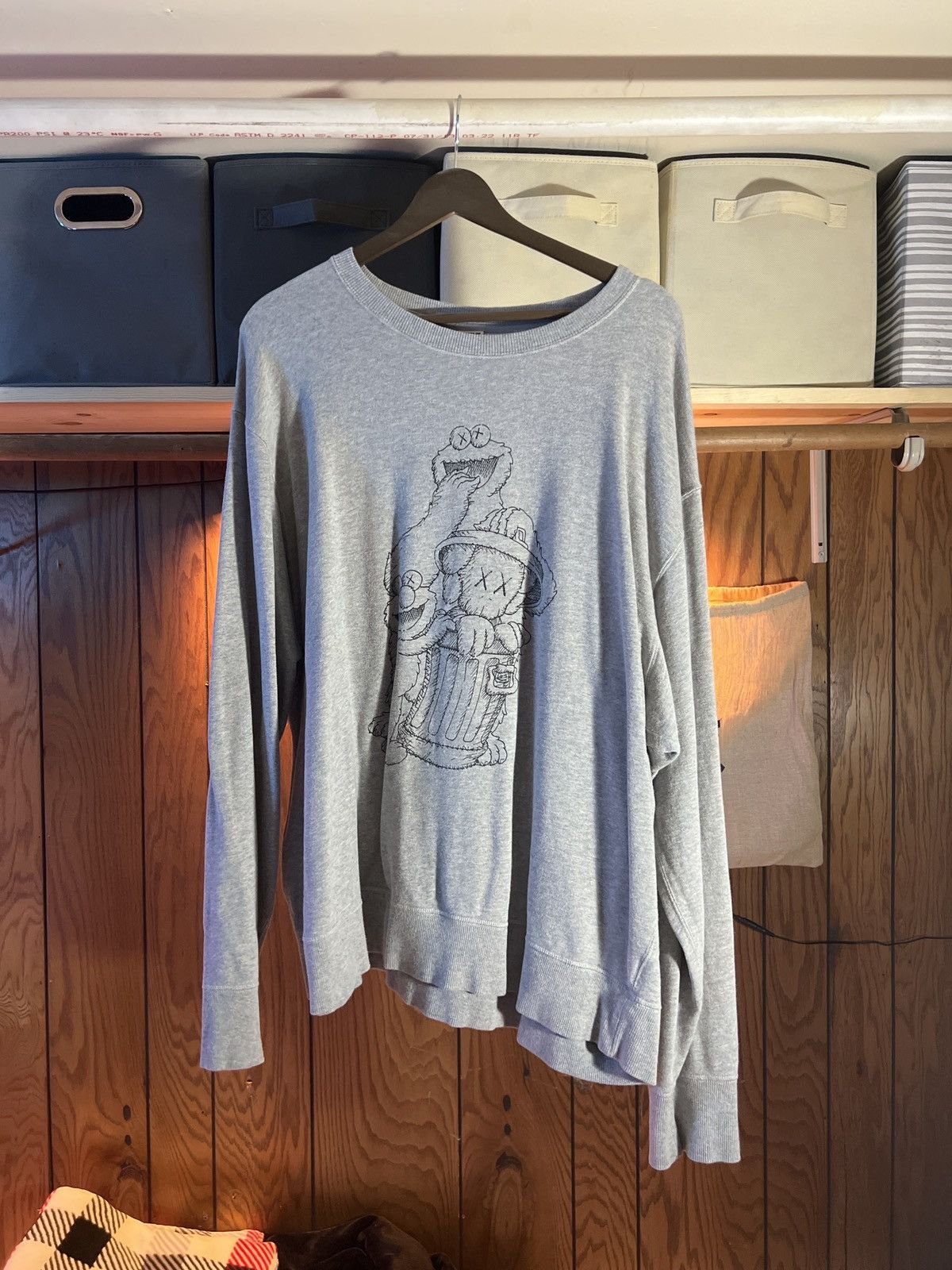 Kaws × Uniqlo Kaws x Uniqlo x Sesame Street companion trash can outline ...