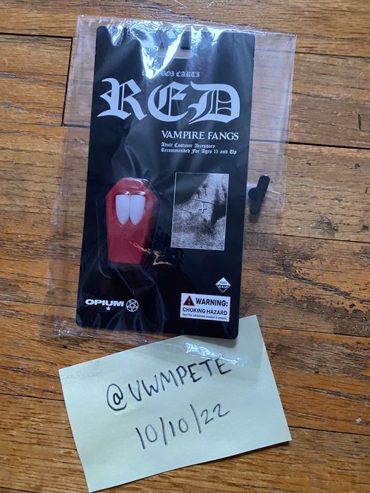 Playboi Carti Playboi Carti Whole Lotta Red Vampire Fangs *NEW* | Grailed