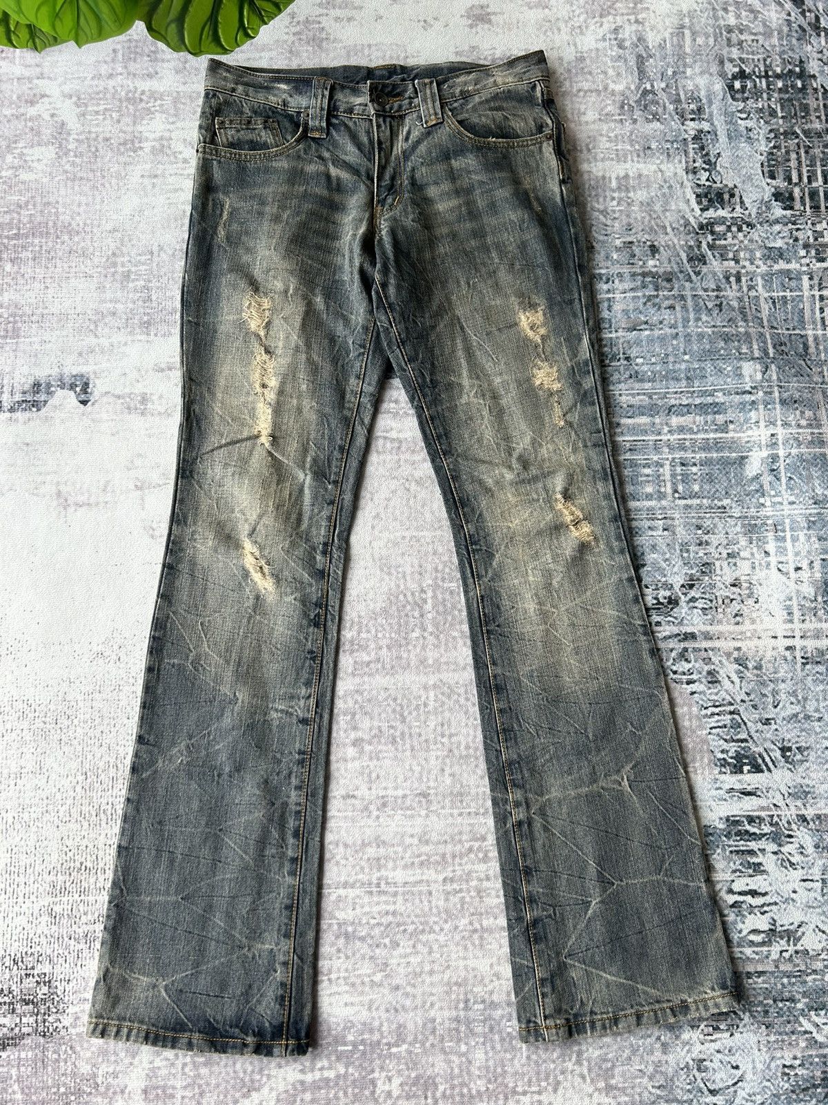 Semantic Design Flared Distressed Semantic Design Jeans | Grailed