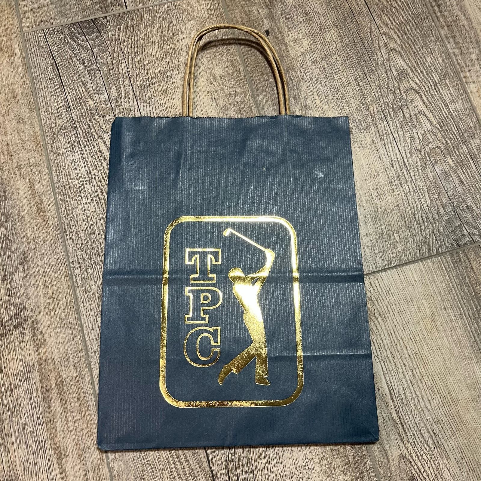 The Unbranded Brand TPC Paper Shopping Bag Blue with Gold Logo | Grailed