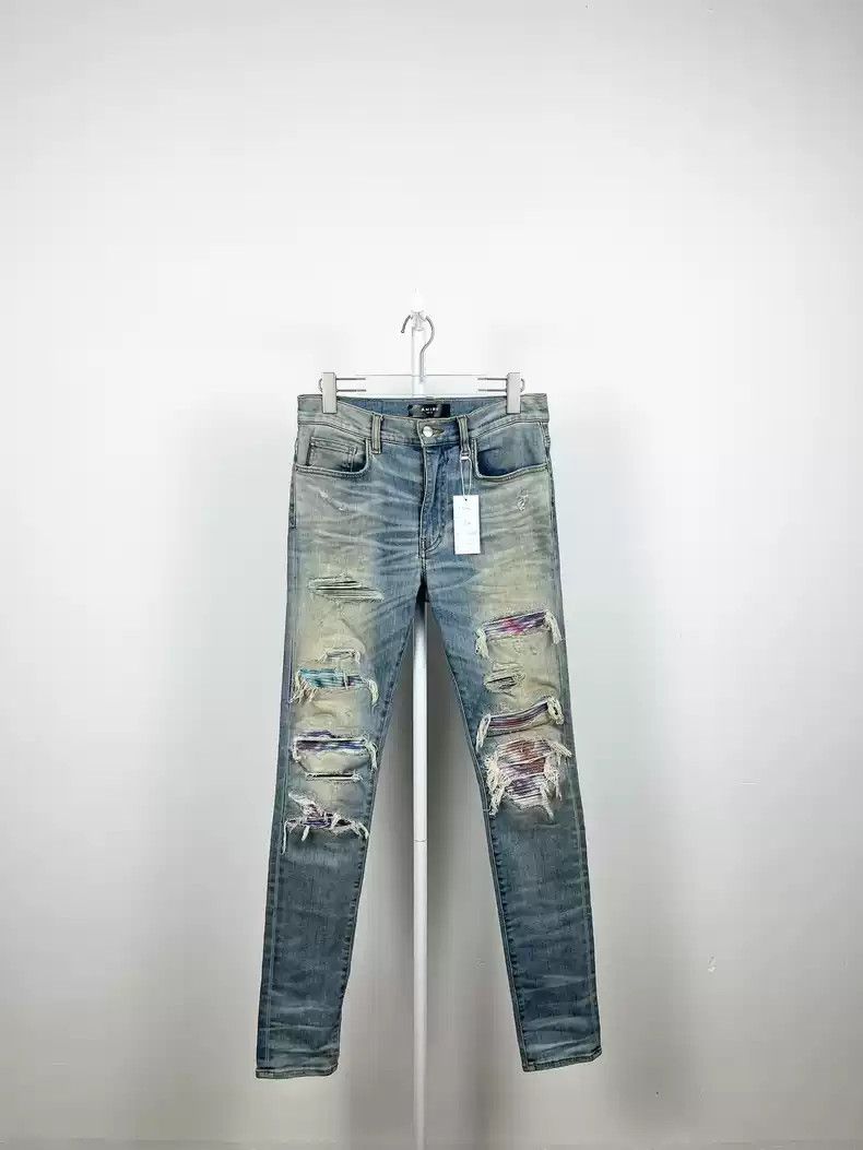 Amiri Amiri light blue color render ripped jeans | Grailed