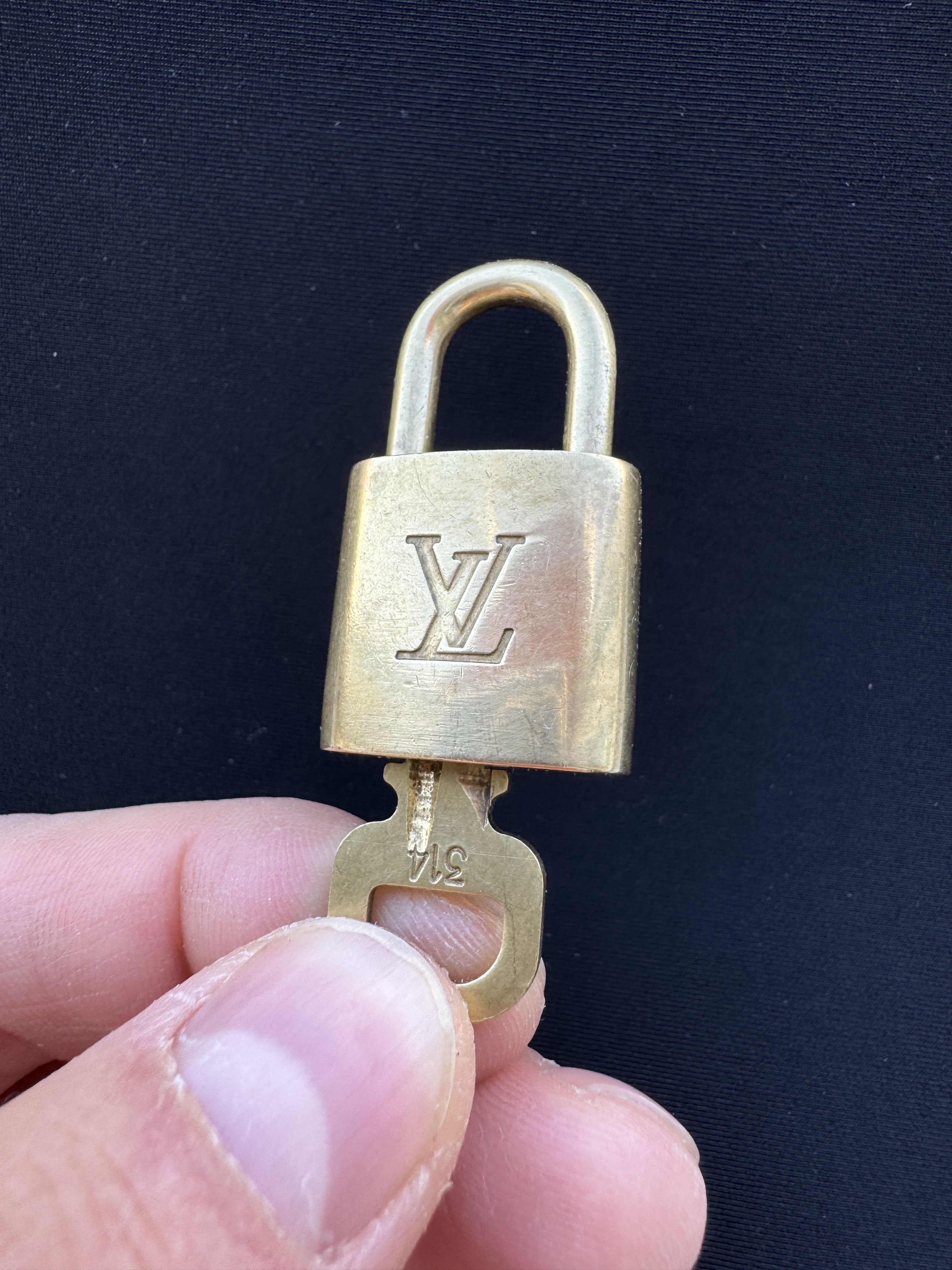 Louis Vuitton Vintage Louis Vuitton 314 lock with key #233 | Grailed
