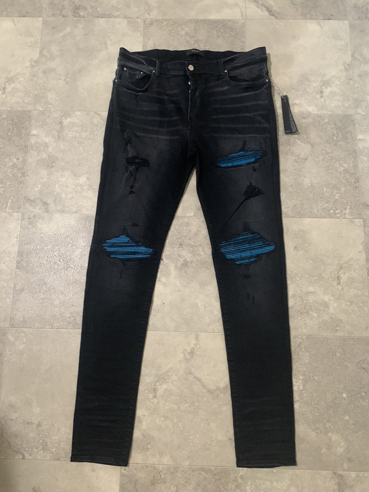 Amiri Black and Blue Paint Patch MX1 Jeans | Grailed