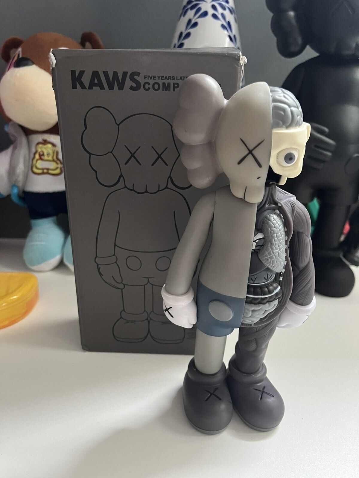 Kaws Kaws Companion Flayed Open Edition Vinyl Figure Grey | Grailed
