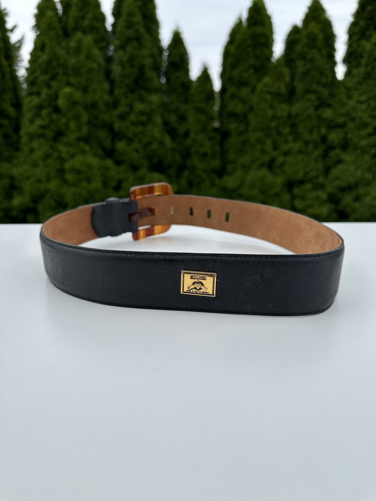 Moschino Moschino black belt with golden logo and amber buckle | Grailed