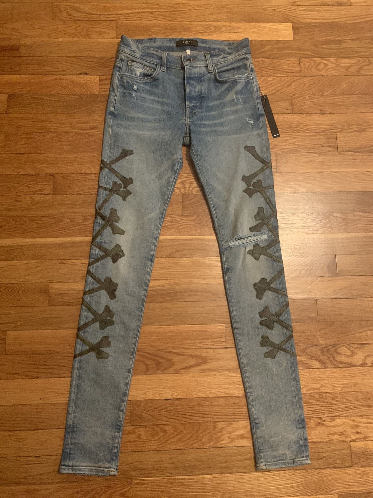 Amiri Lightwash Camo Leather Bones Patch Denim | Grailed