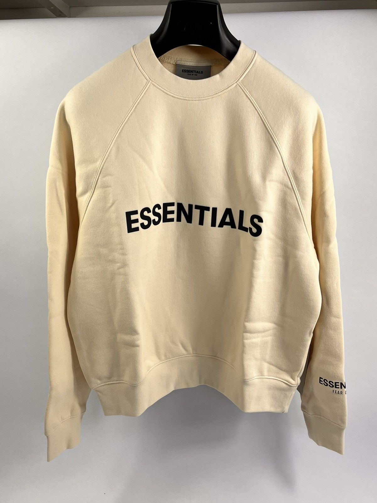 Essentials LOGO PRINT CREAM JUMPER | Grailed