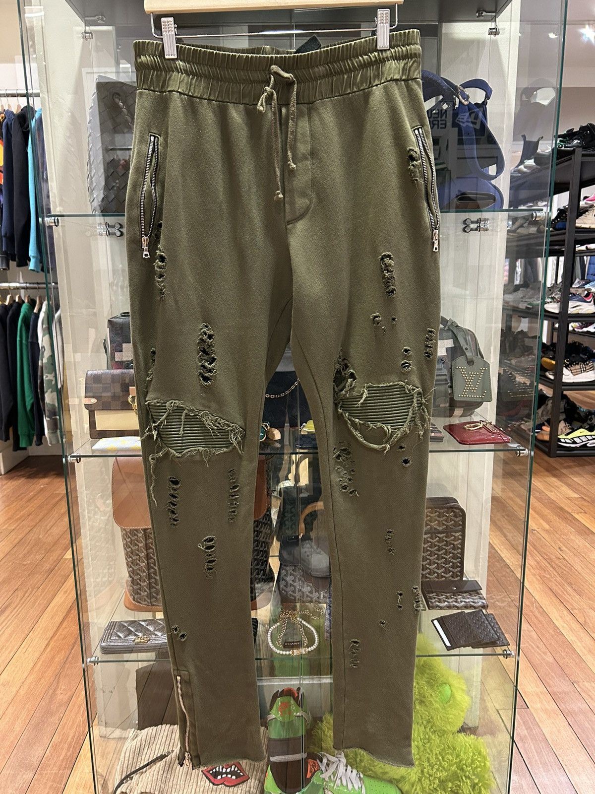 Amiri Amiri Ripped Sweatpants with Patches | Grailed
