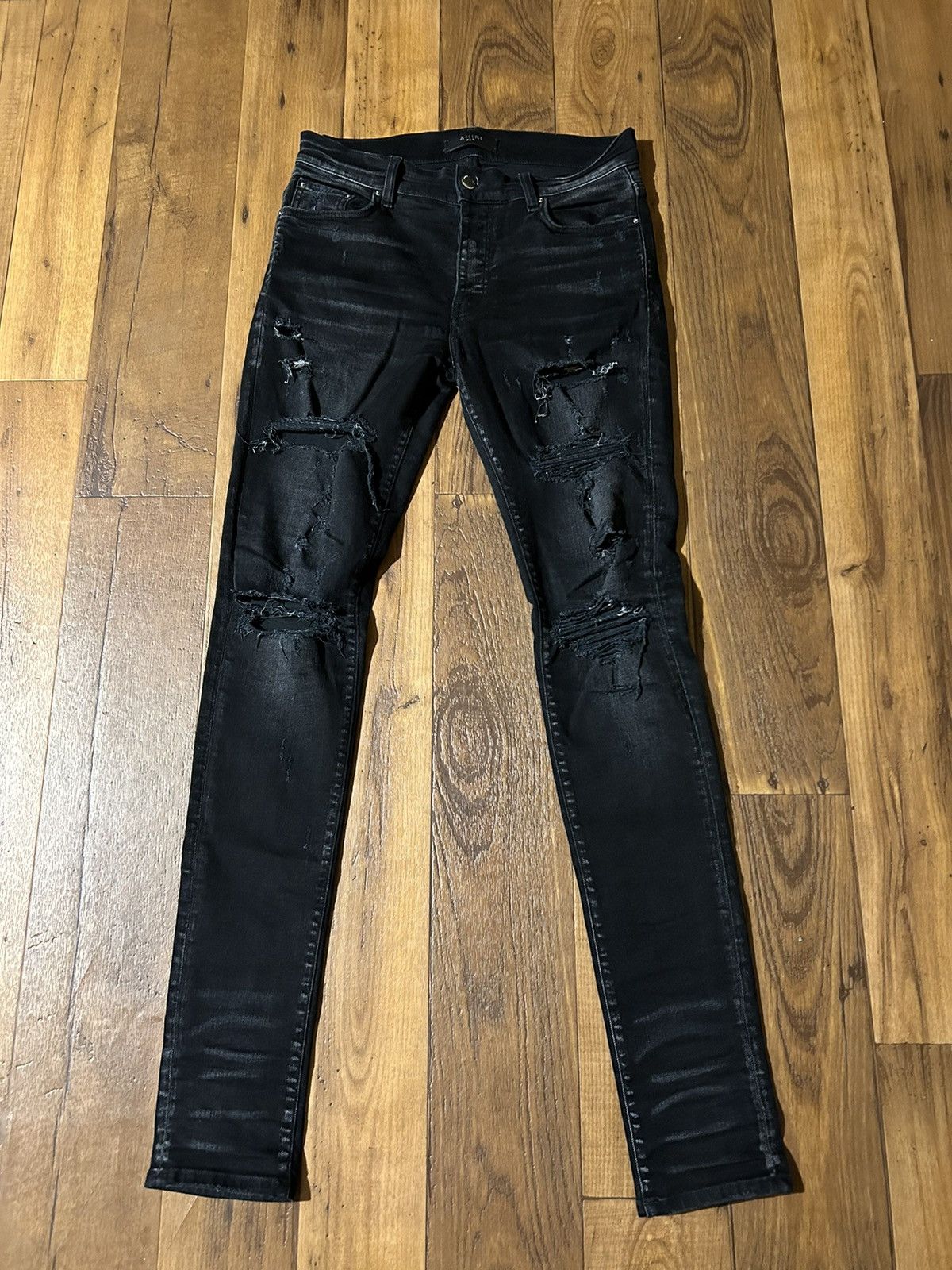 Amiri Amiri Aged Black Thrasher Jeans | Grailed