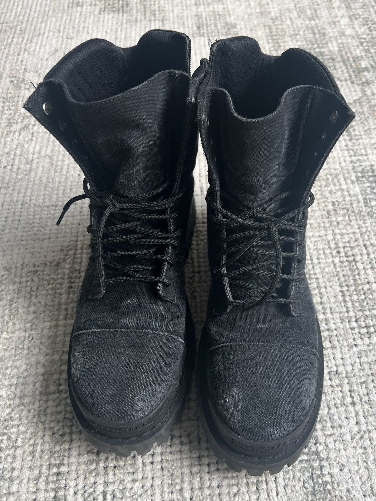 Balenciaga Balenciaga distressed canvas strike combat boots | Grailed