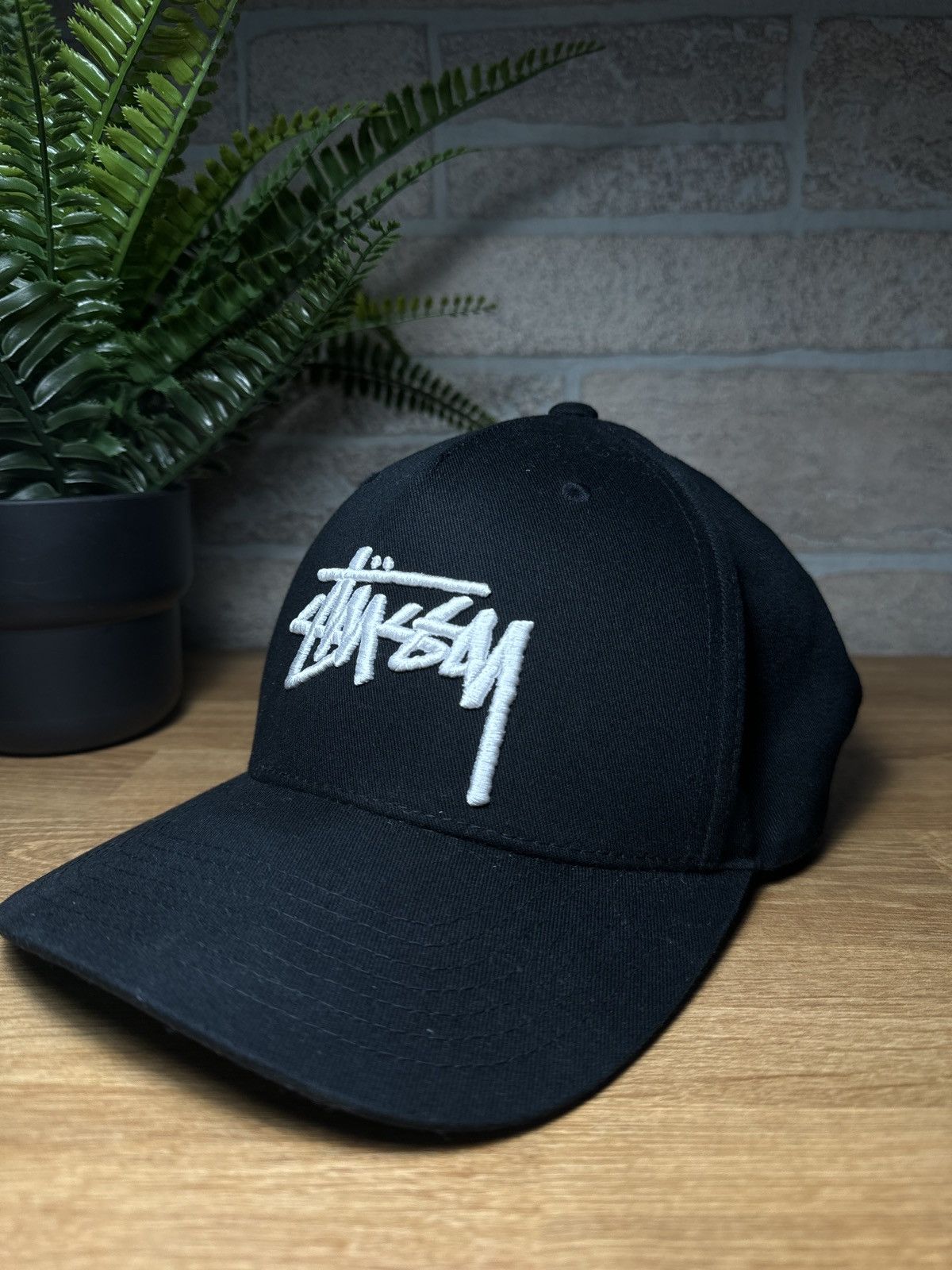 Stussy Stussy black snapback hat | Grailed