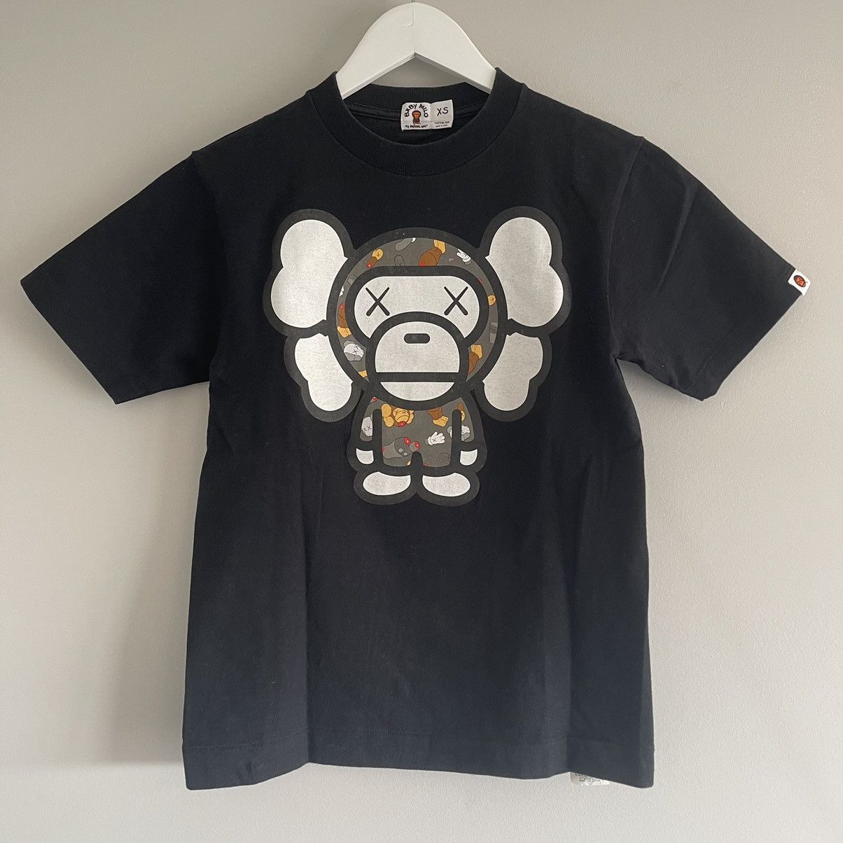 Bape × Kaws OG Baby Milo x Kaws Dissected Slaughter Camo Tee | Grailed