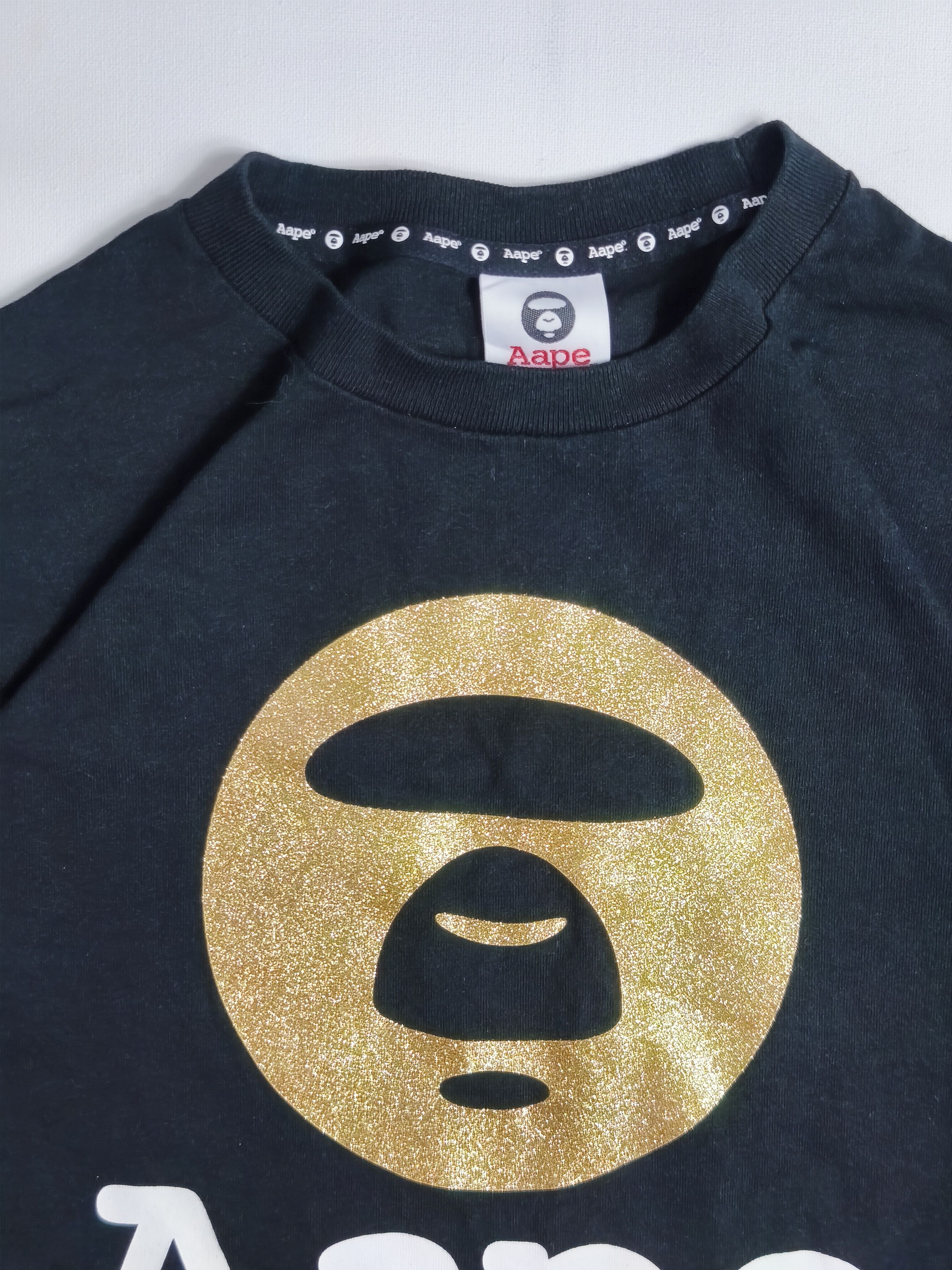 Aape × Bape Aape by a bathing ape t shirt gold logo | Grailed