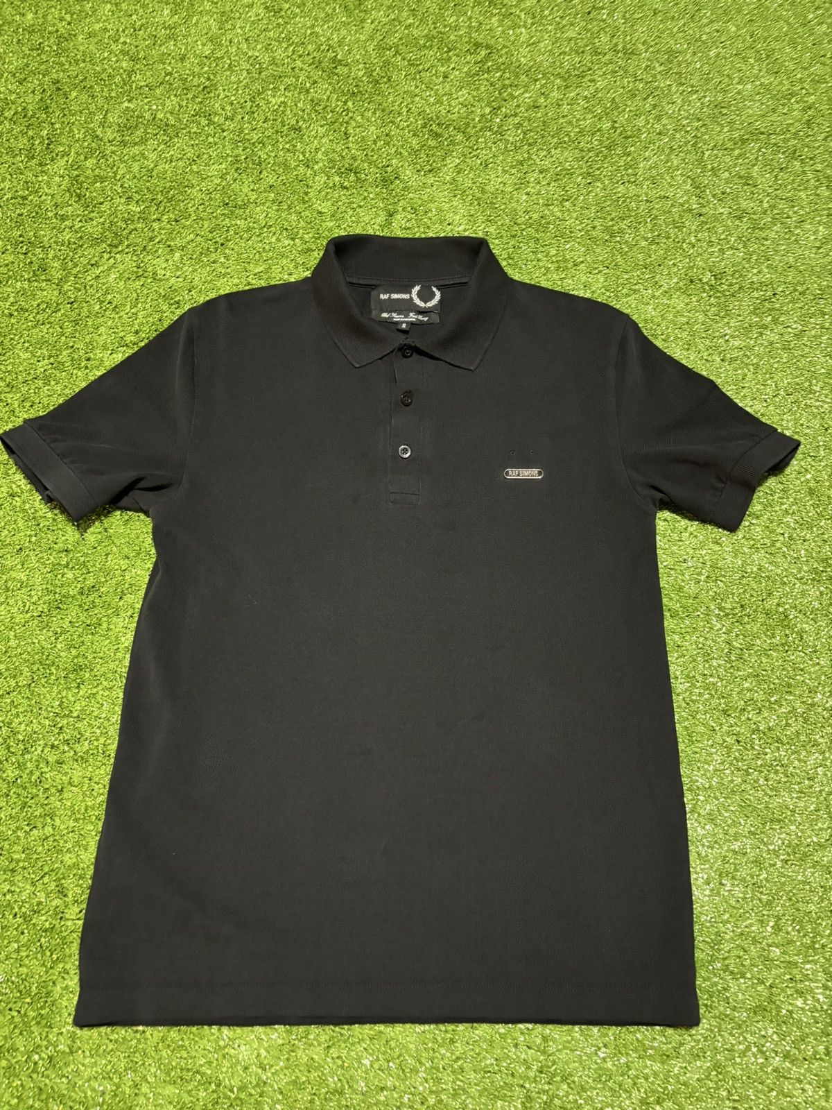 Raf Simons Fred Perry x Raf Simmons Enamel Pin Polo Shirt ‘Black’ | Grailed Raf Simons Fred Perry x Raf Simmons Enamel Pin Polo Shirt ‘Black’ | Grailed