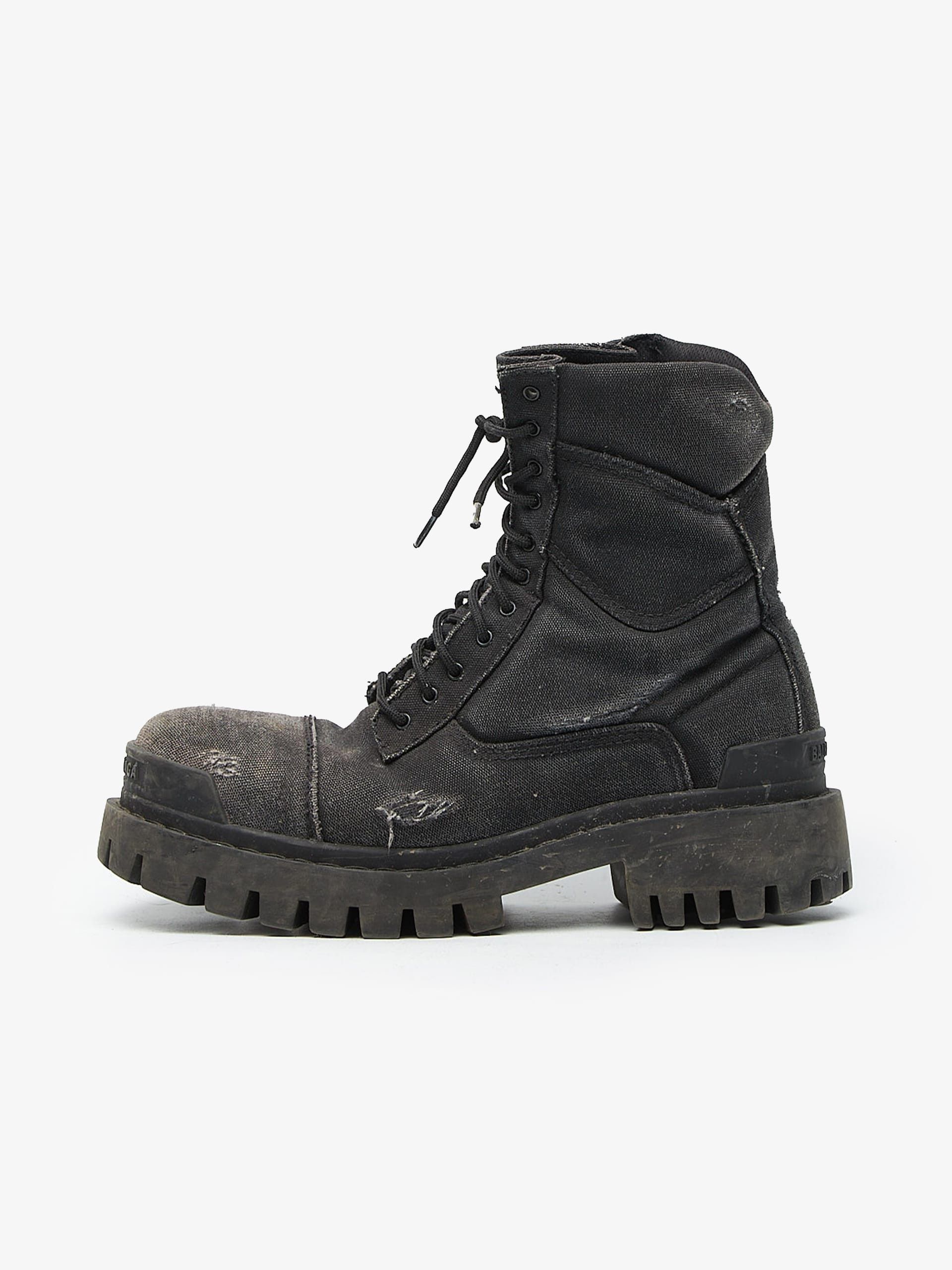 Balenciaga Black Washed Distressed Canvas Strike Boots | Grailed