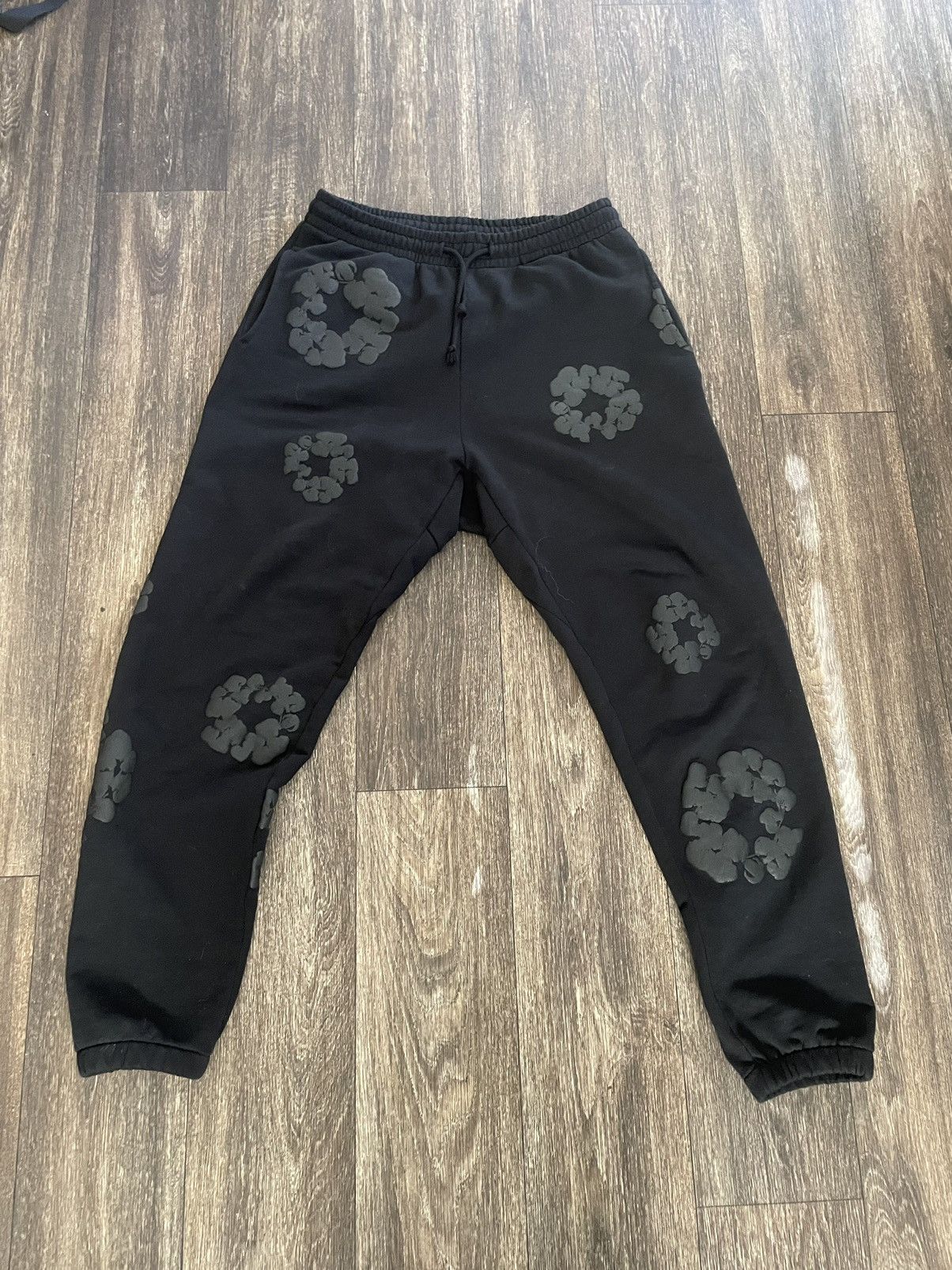 DENIM TEARS Denim Tears Black monogram sweats | Grailed